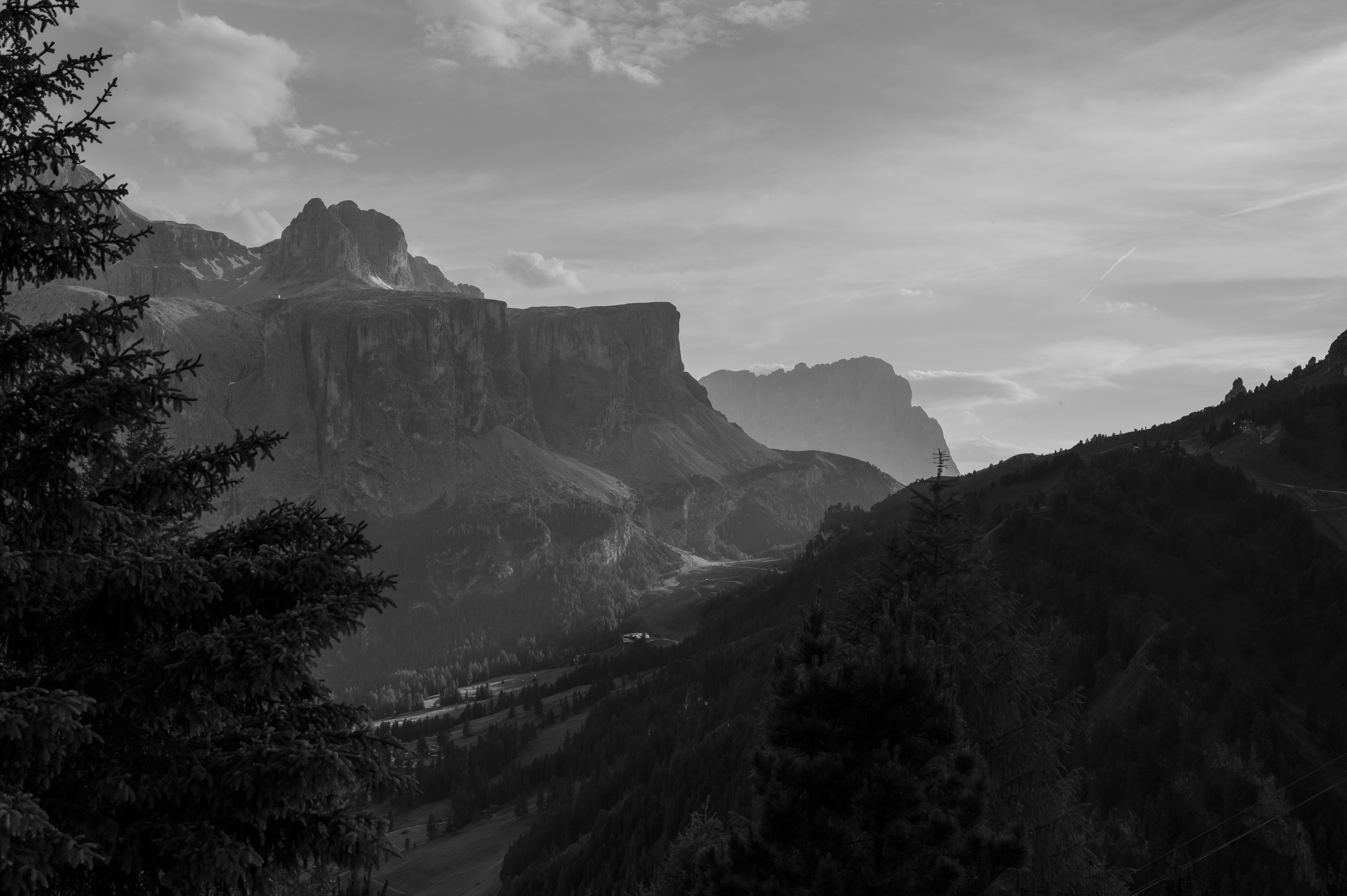 Echoes of the Valley: Sunlit Cliffs Across a Quiet Basin