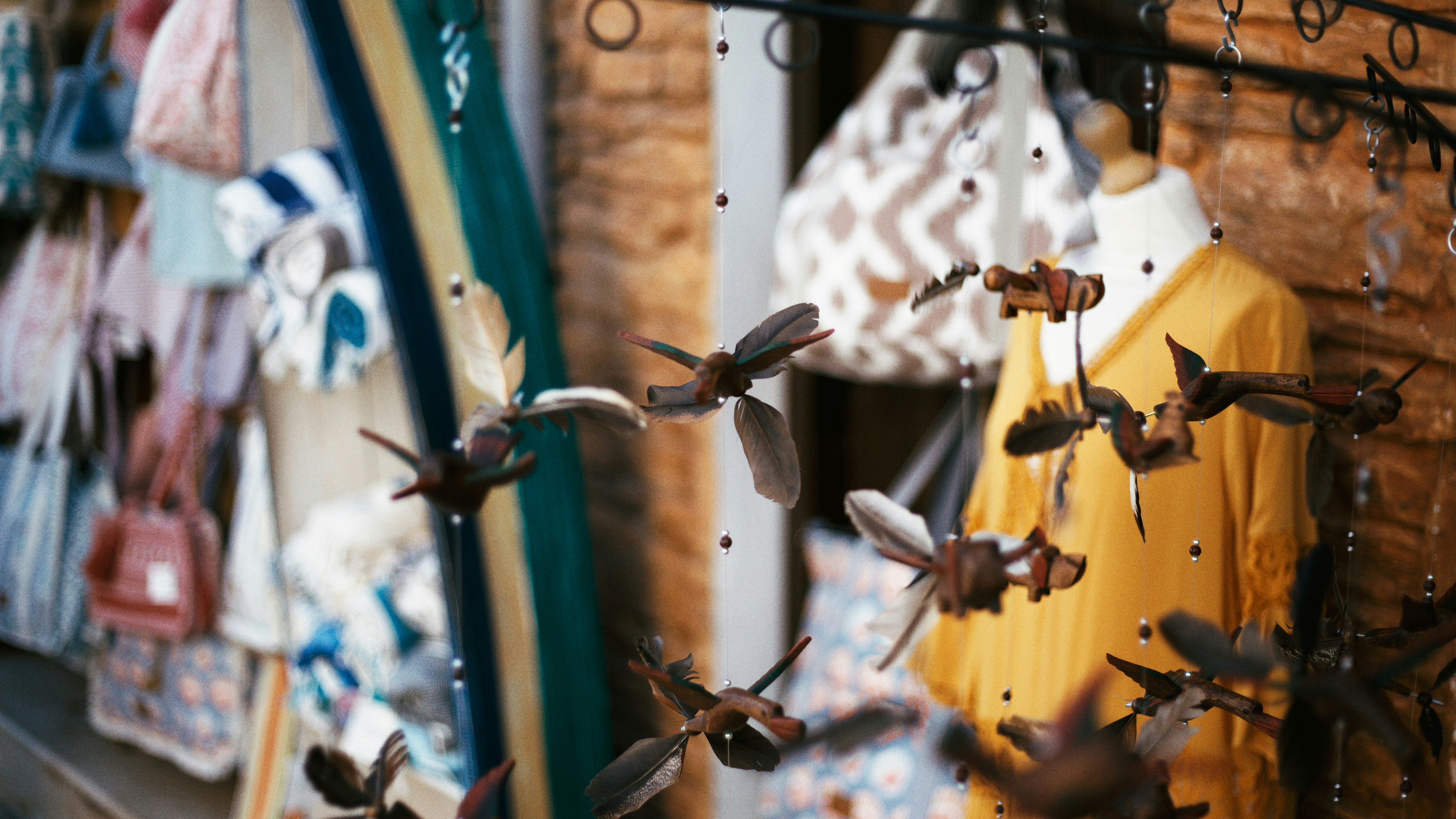 Fluttering Doves Above a Bustling Market Façade