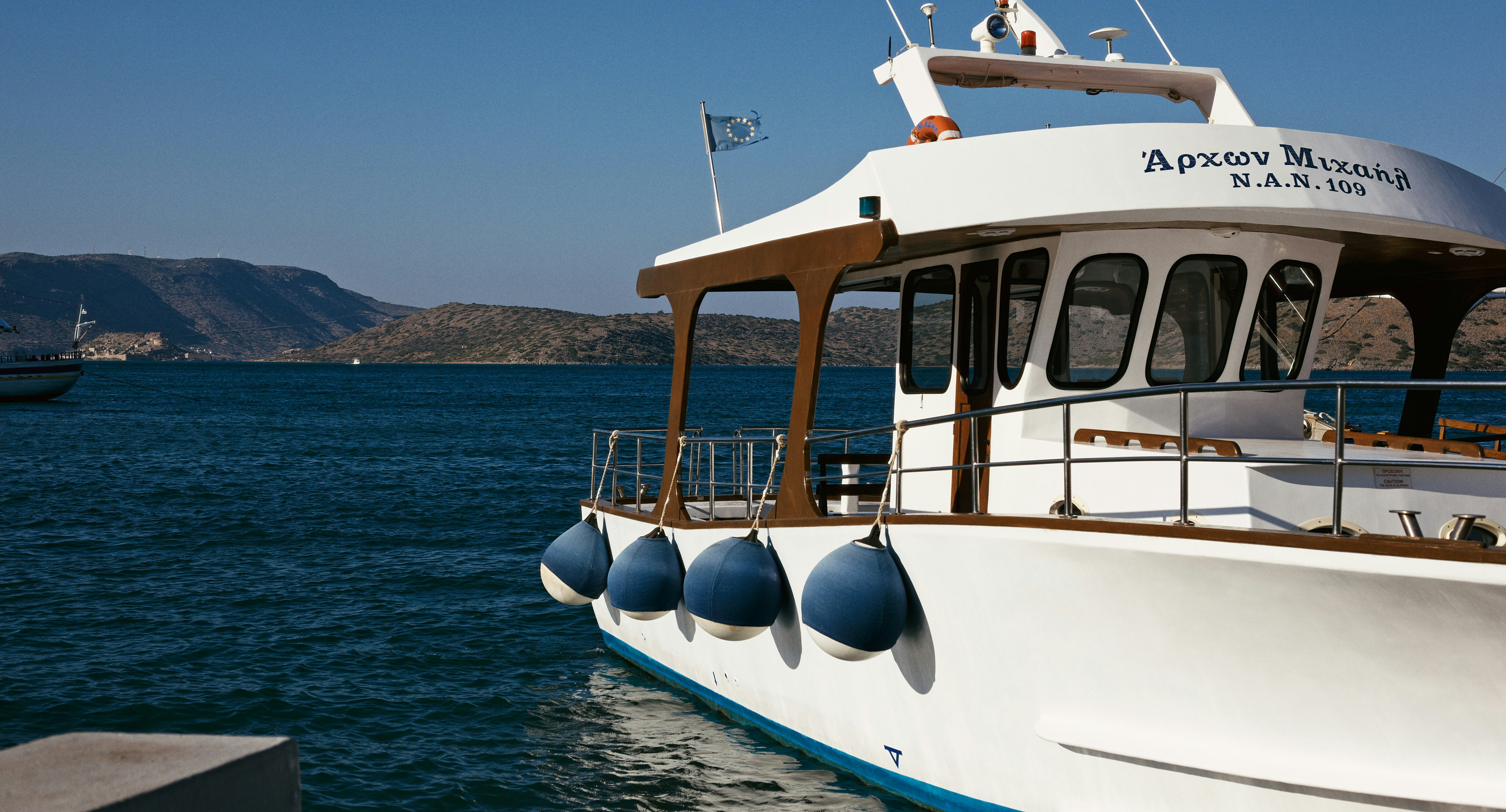 Harborbound: The Crescent of a Sea-Kissed Vessel