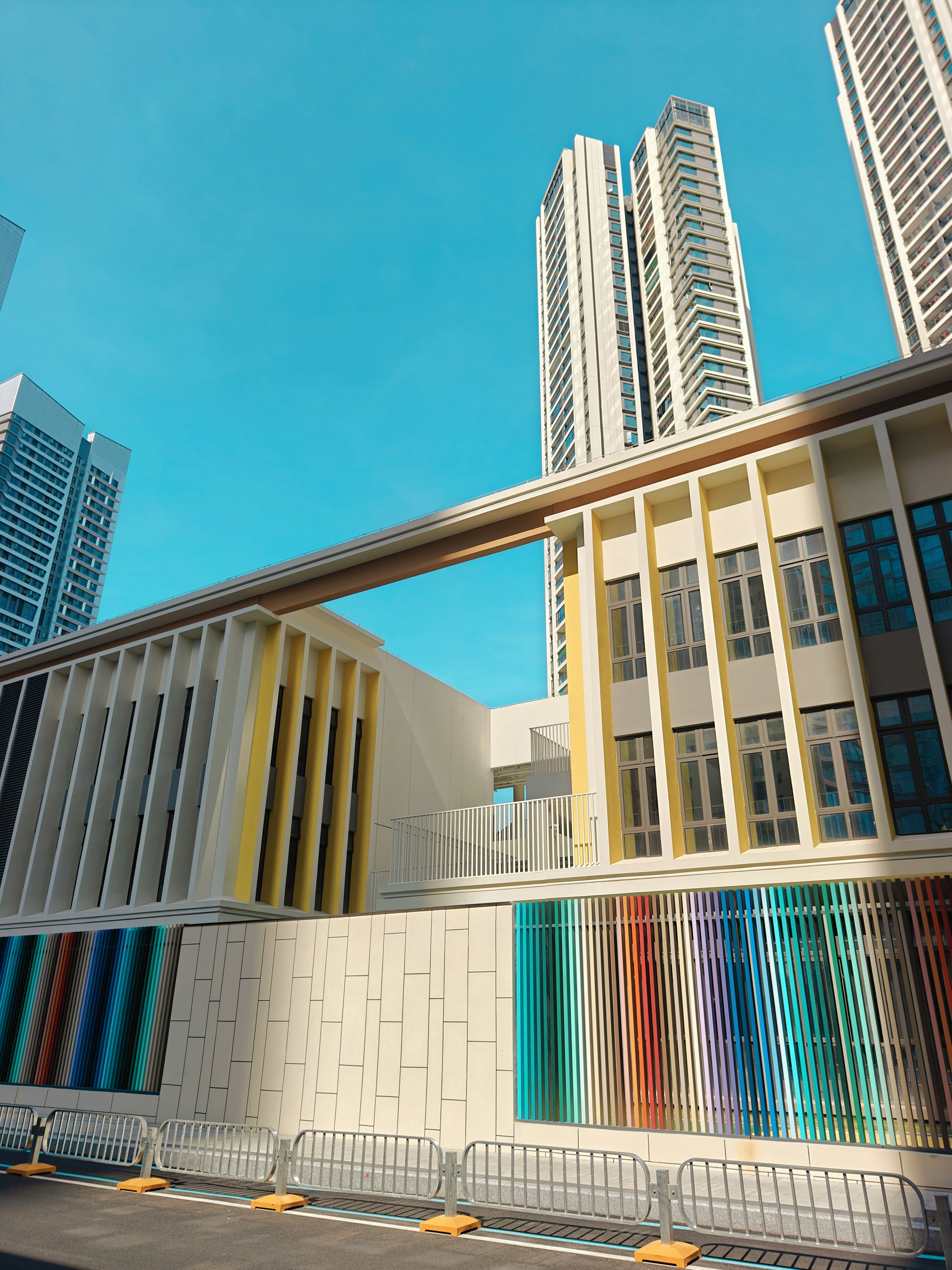 Rainbow Facades Beneath Turquoise Sky