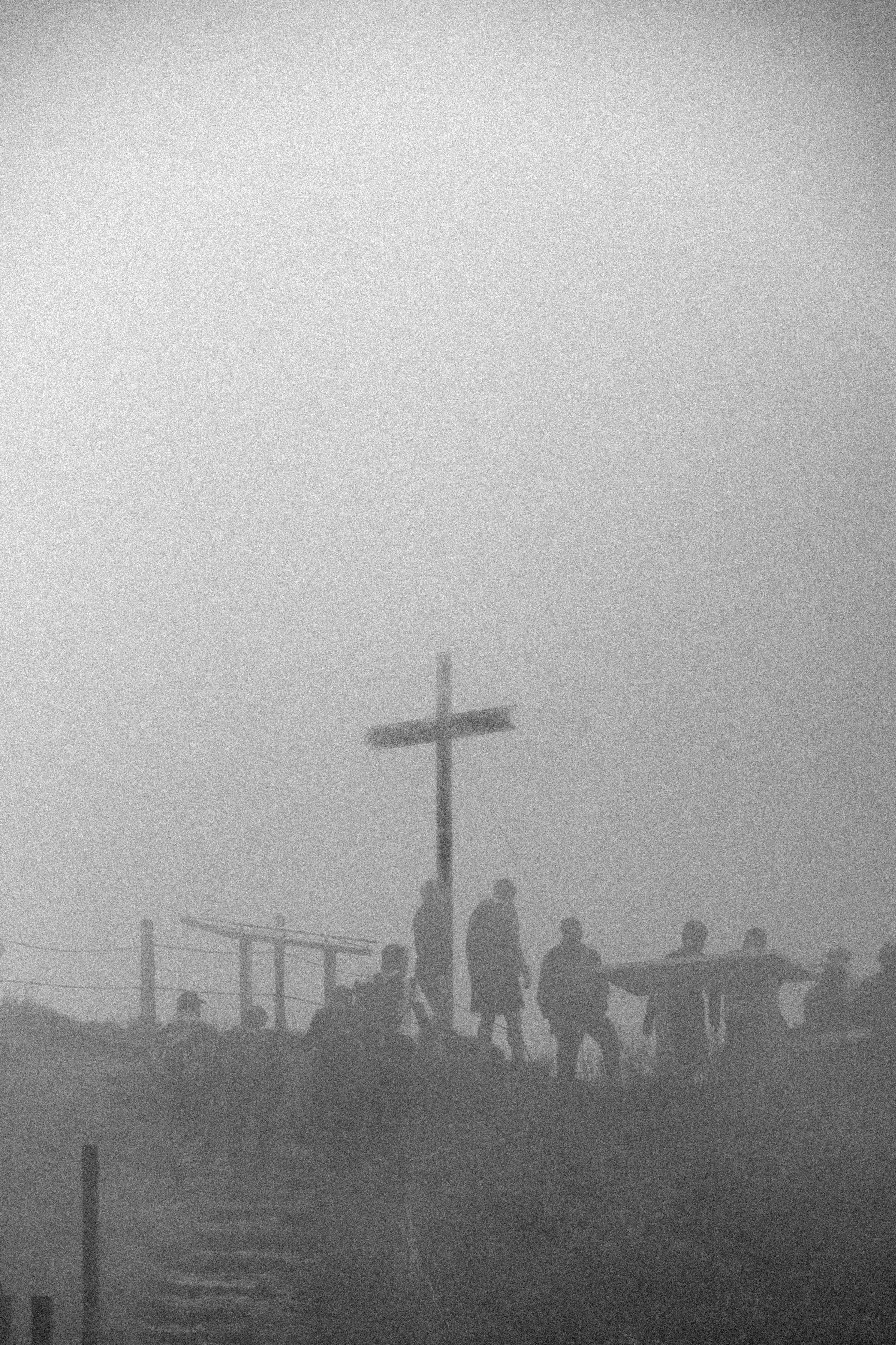 Silhouette at Dawn: A Sacred Assembly in the Mist