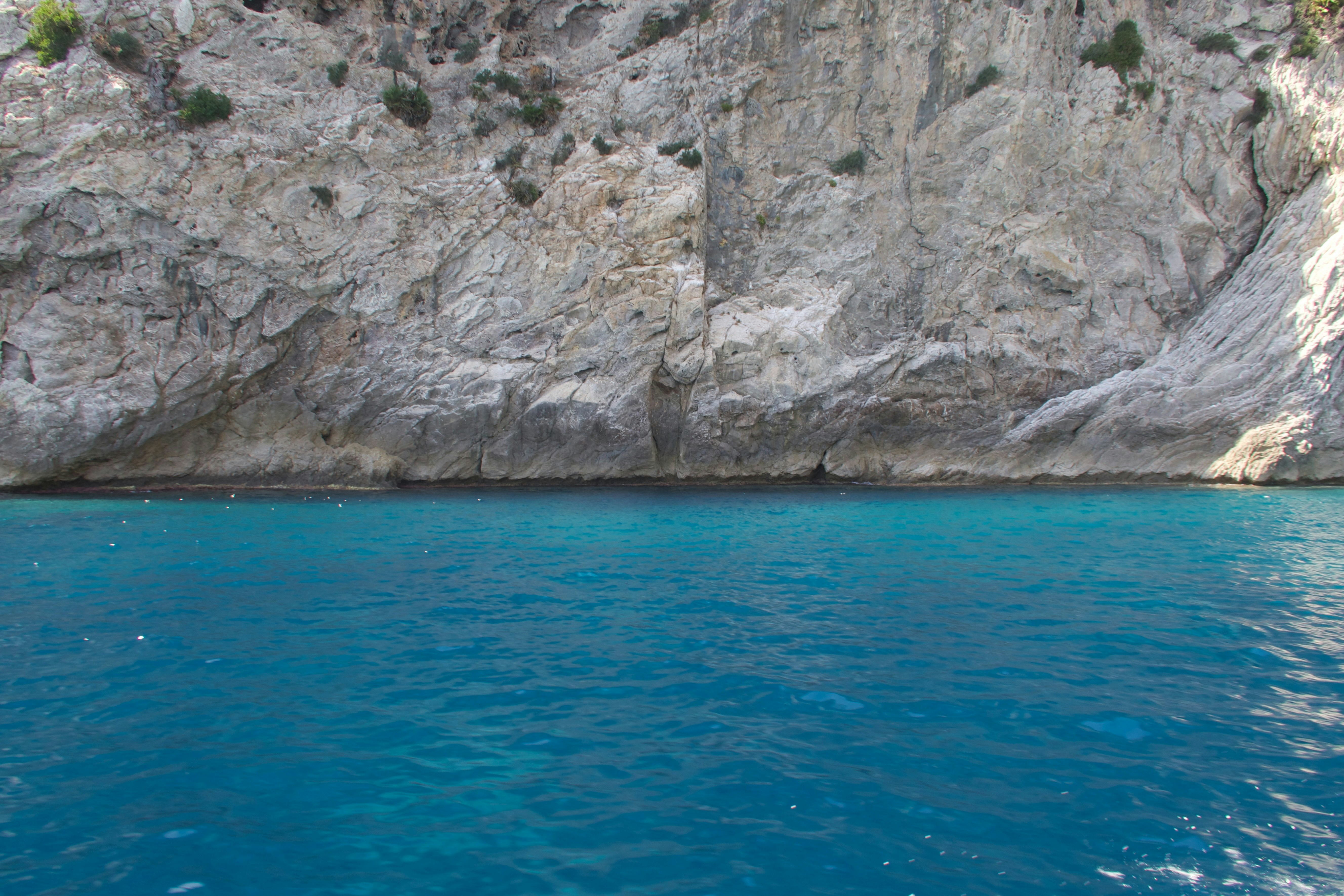 Blue Inlet Against a Limestone Face