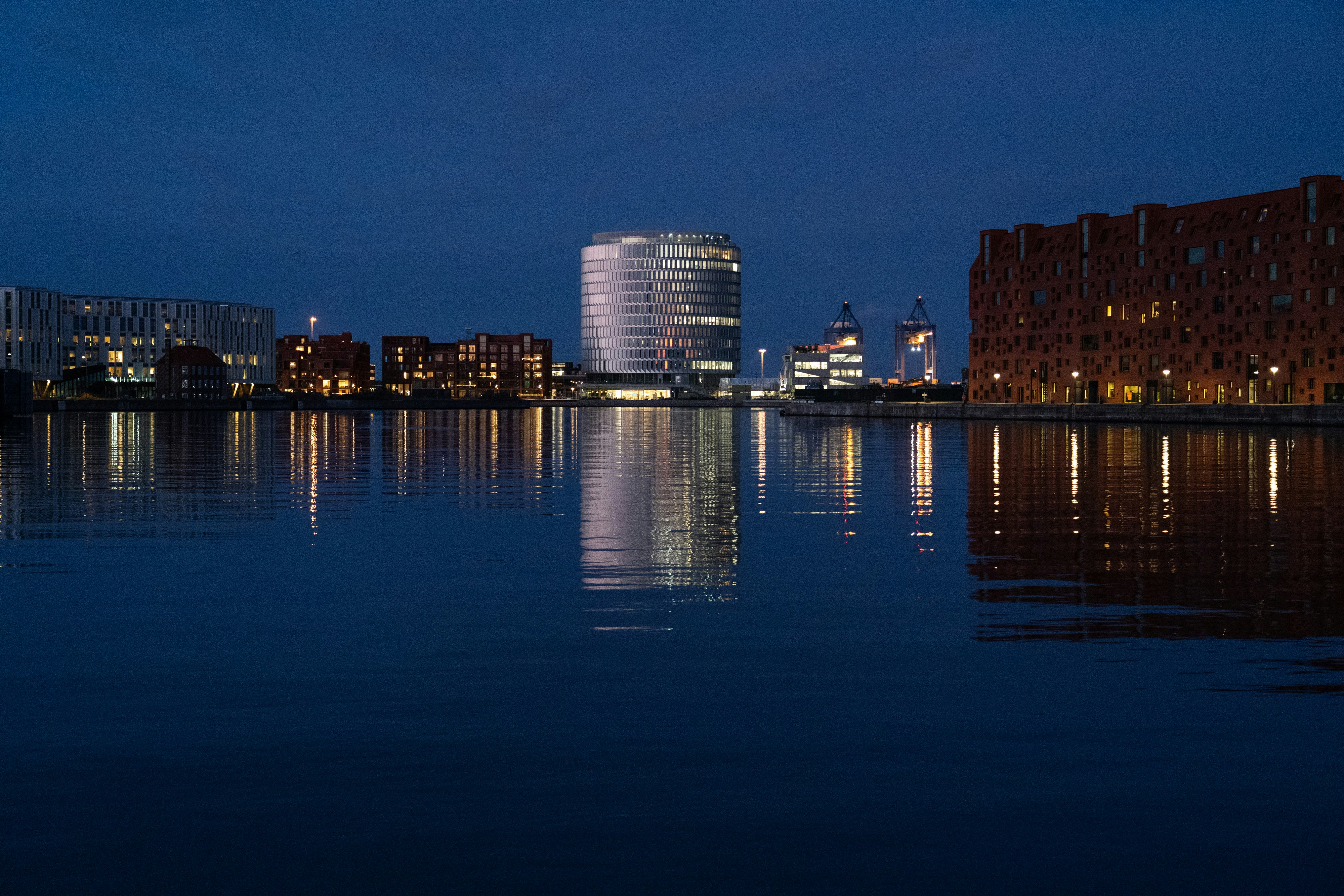 Symmetrical Waterfront Silhouette at Blue Hour