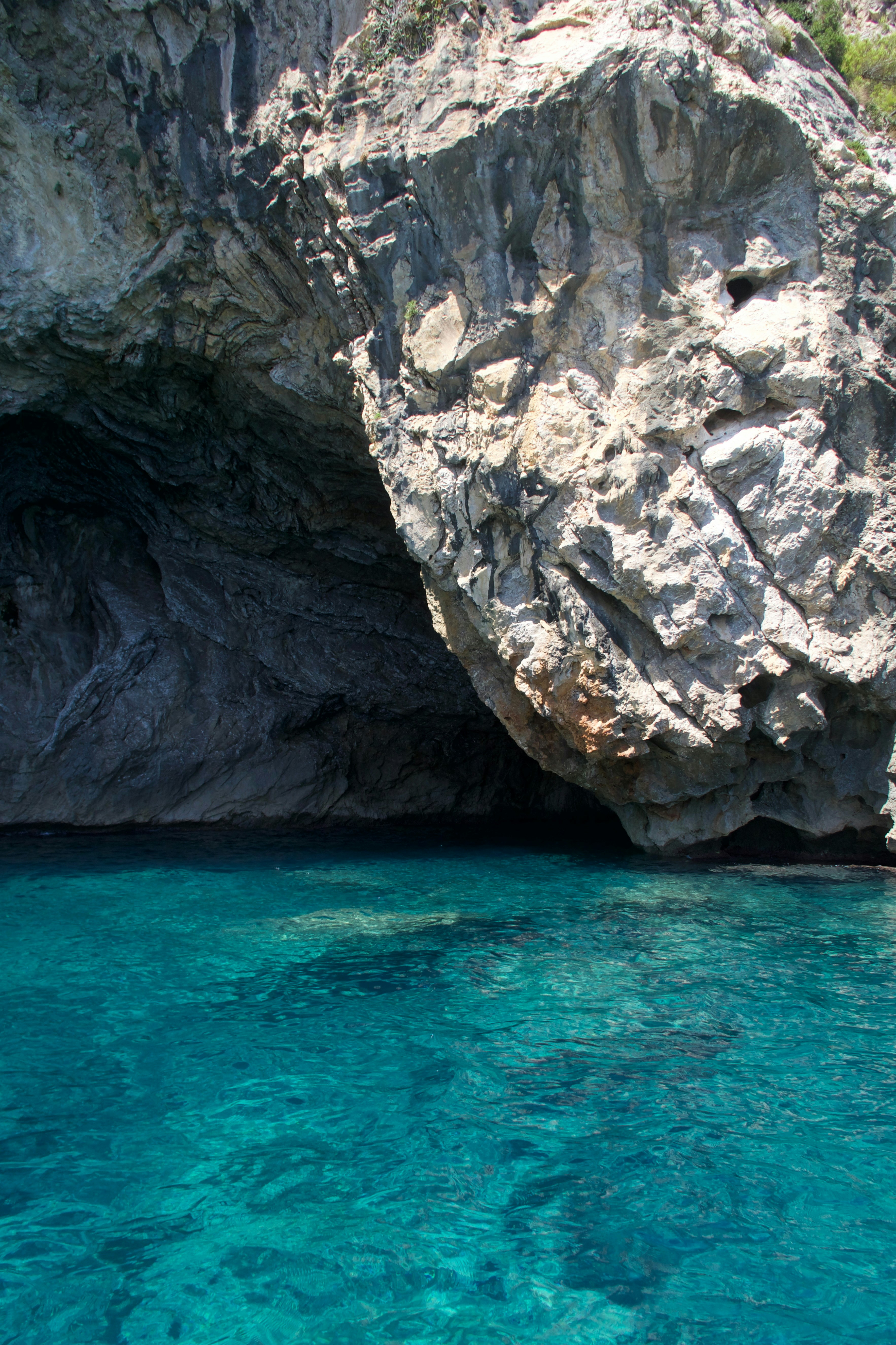 Emerald Sea Ledge: Cobalt Waters Meet Carved Limestone