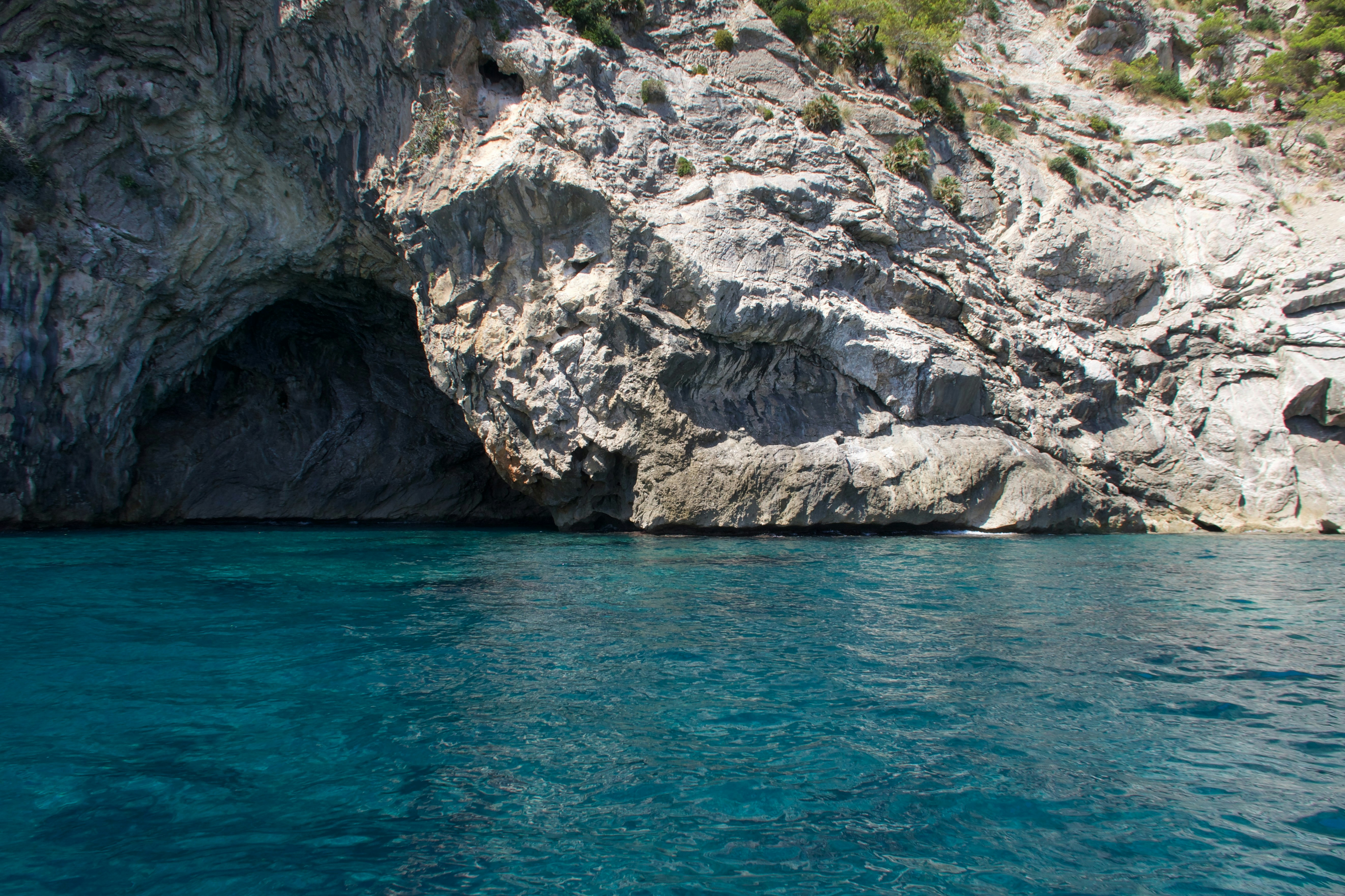 Blue Sea Grotto: A Hidden Cobalt Portal at Dusk