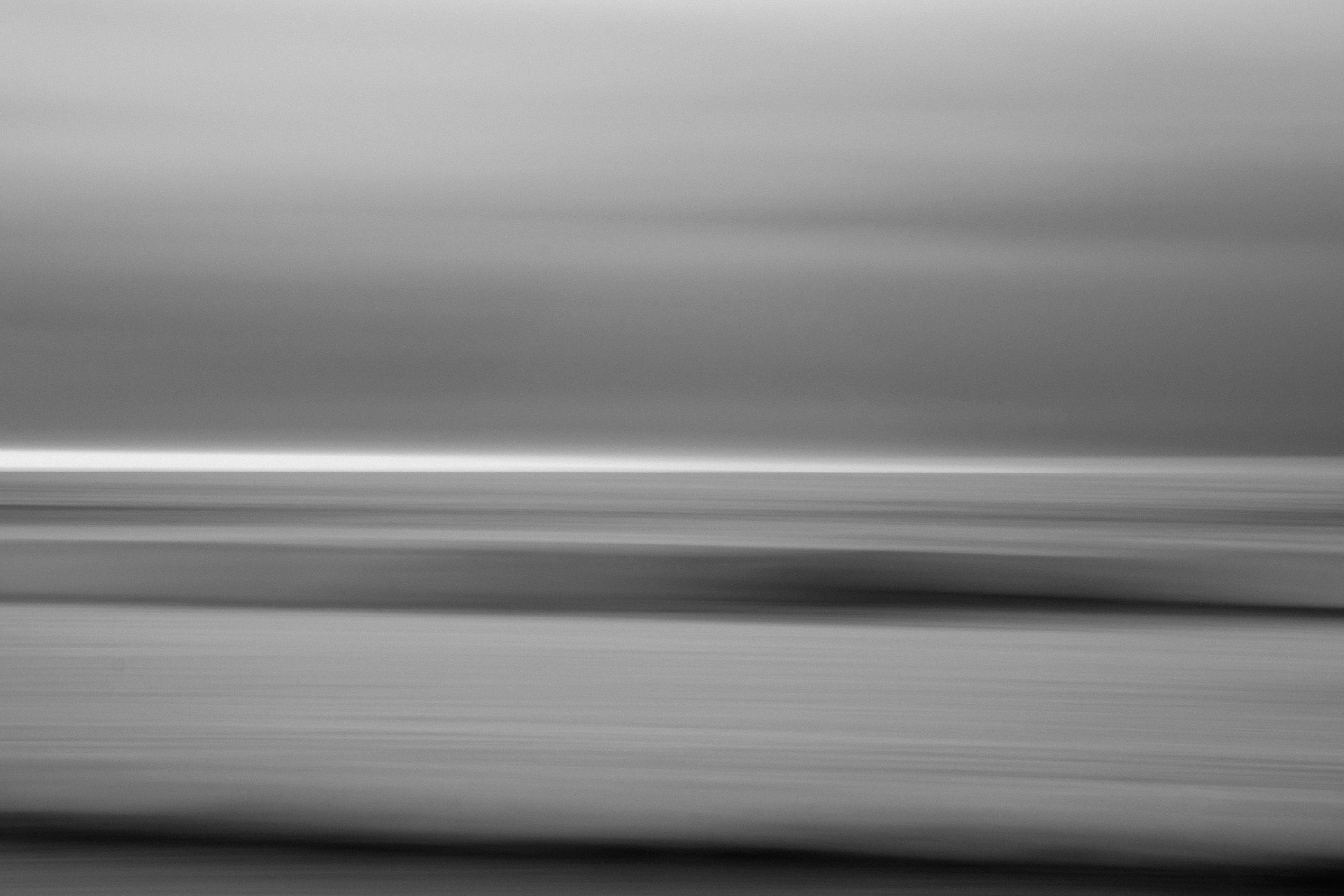 Horizontal Drift: Monochrome Blur Across a Quiet Horizon