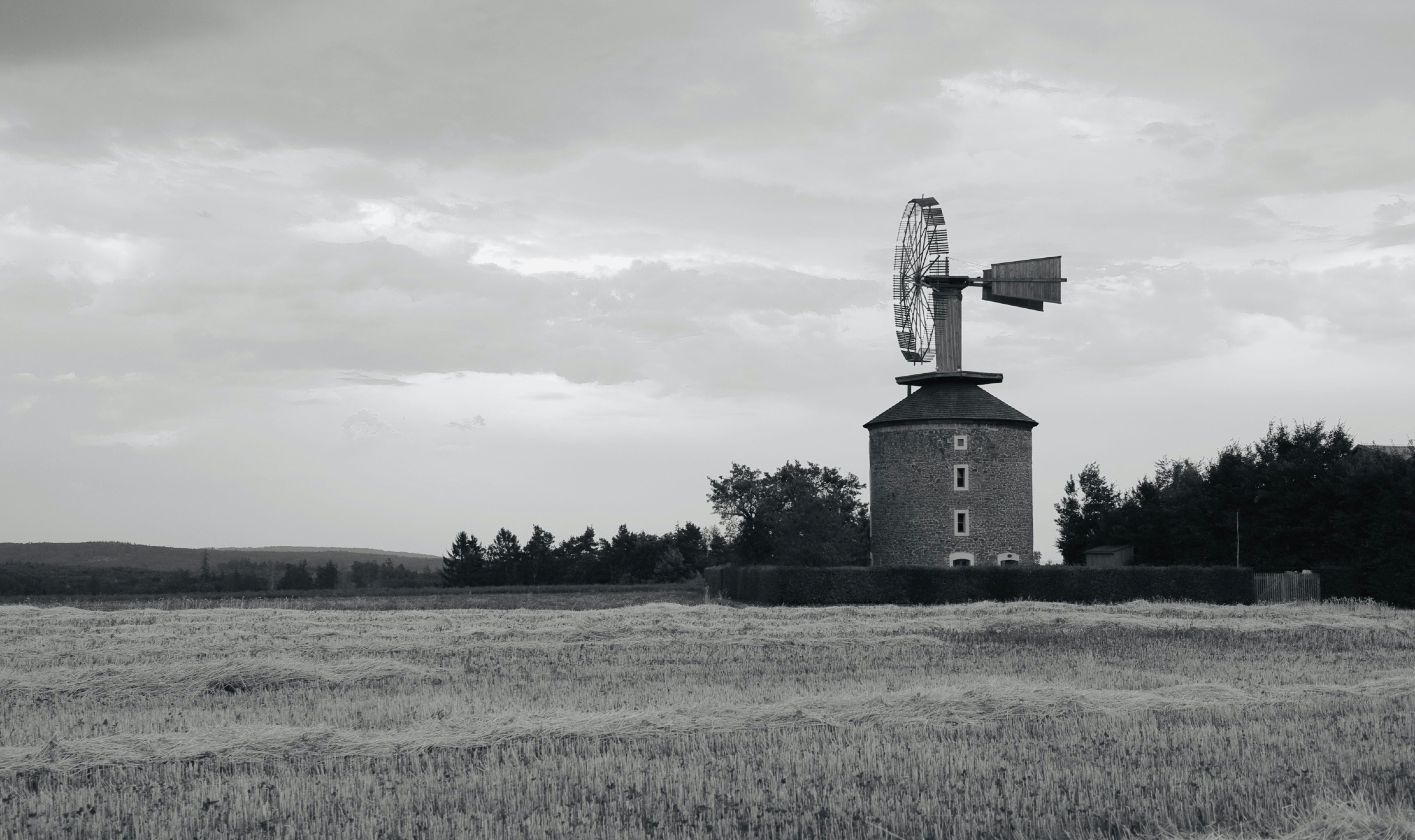 The Silent Windmill: A Monument in Grayscale