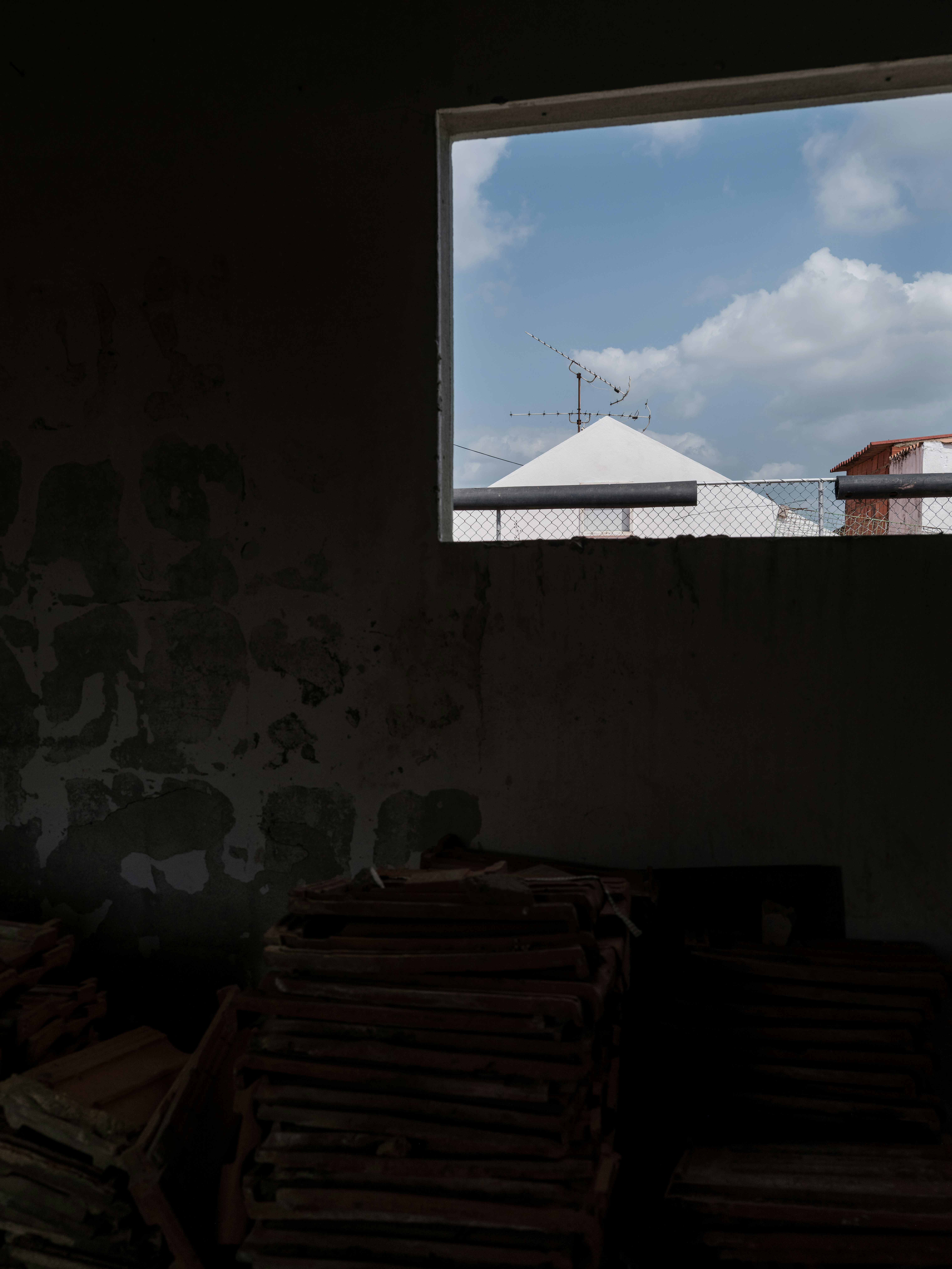 Window to the Sky: Roofline and Cloudscape through a Crumbling Wall