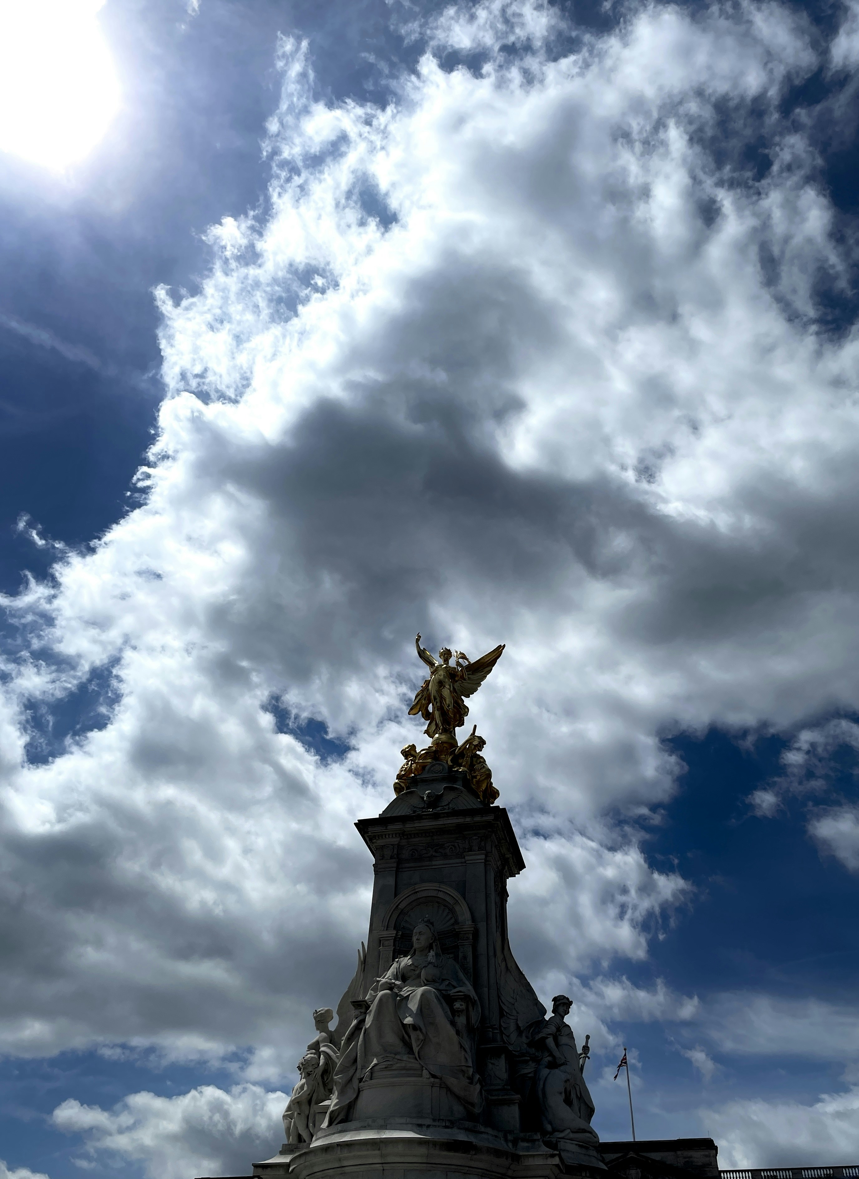 Winged Statue Against a Skywoven Crest