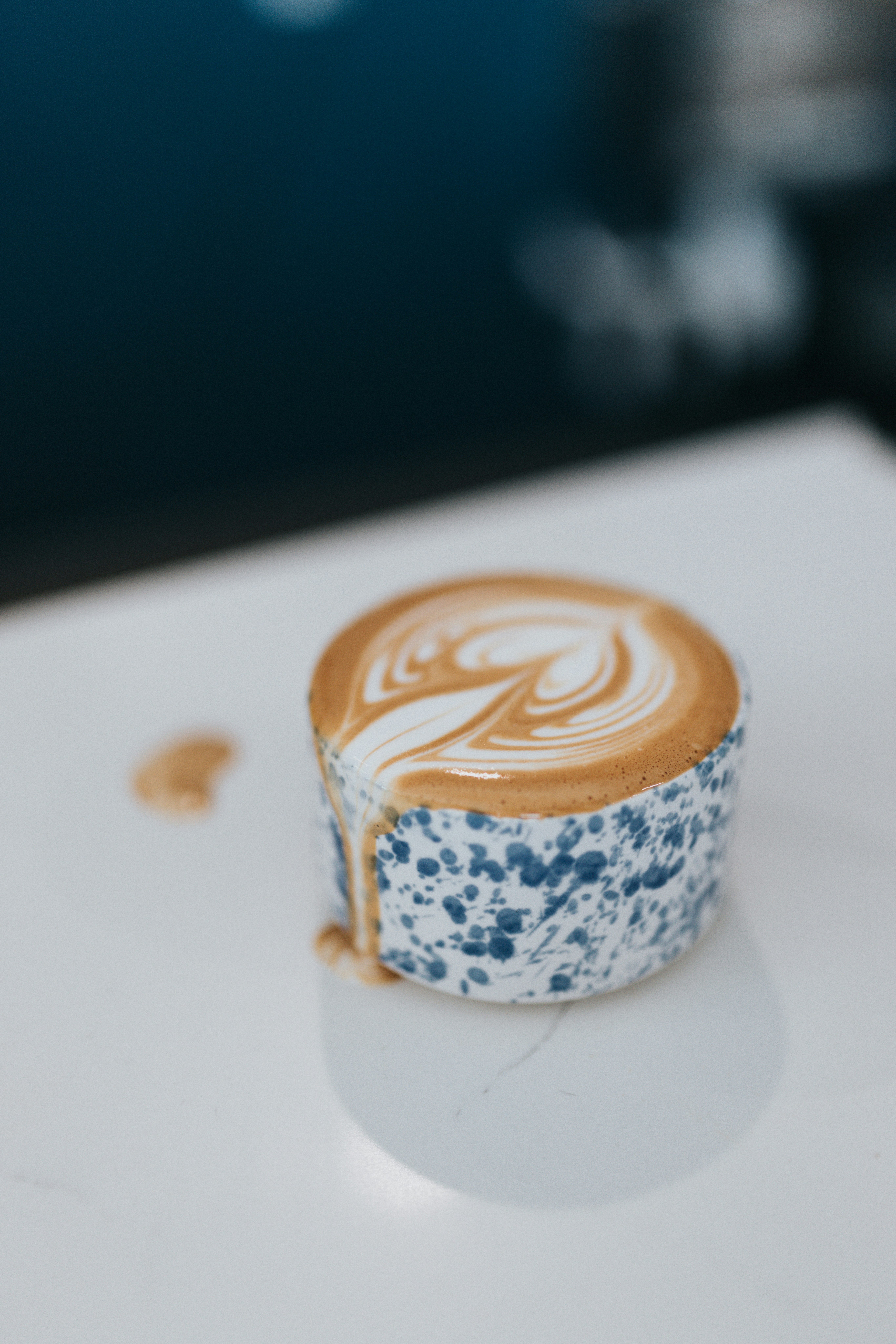 Latte Rosette: A Carved Cookie on a Clean White Surface