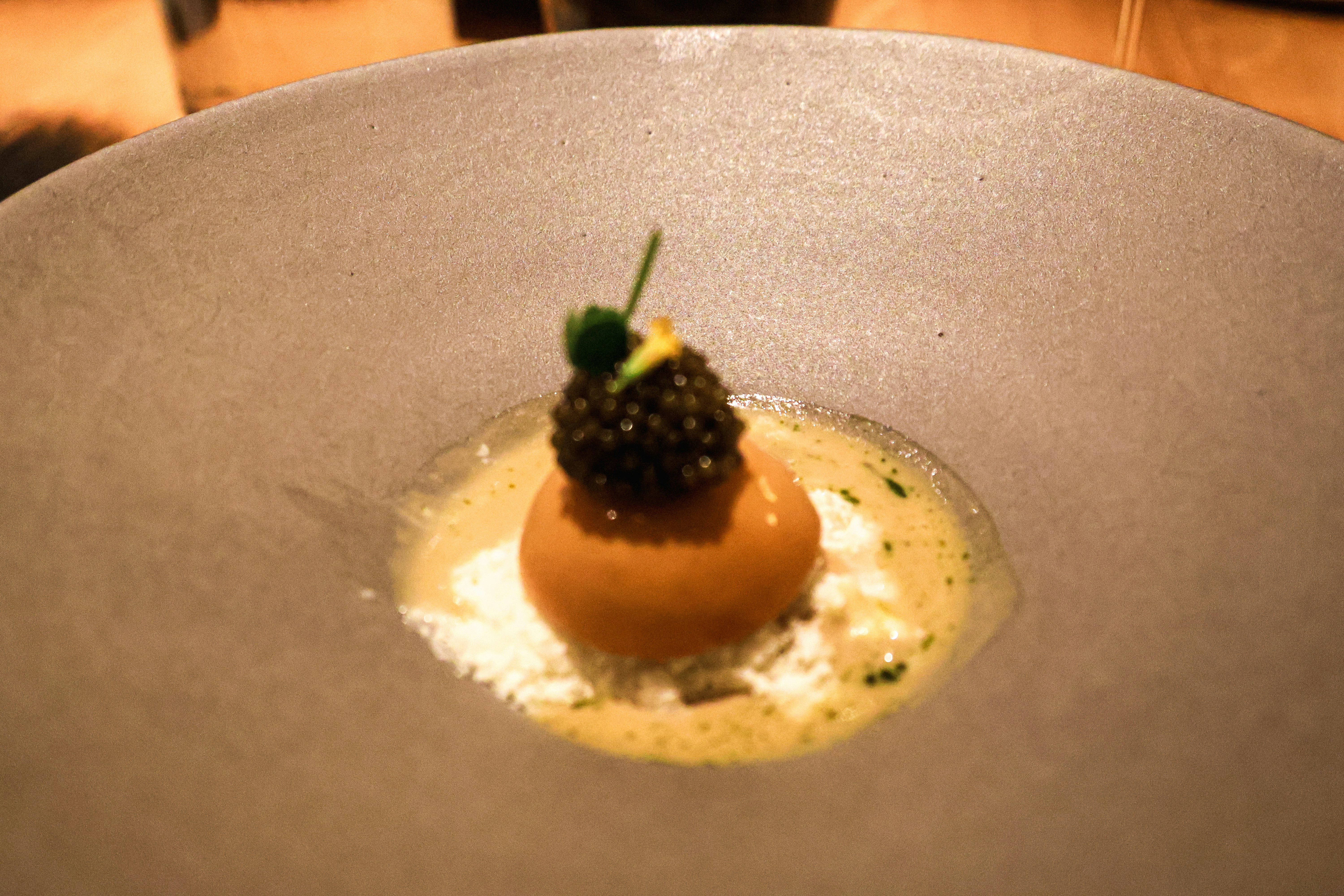 Central Sphere: A Delicate Dessert Blossoms in Melted Light