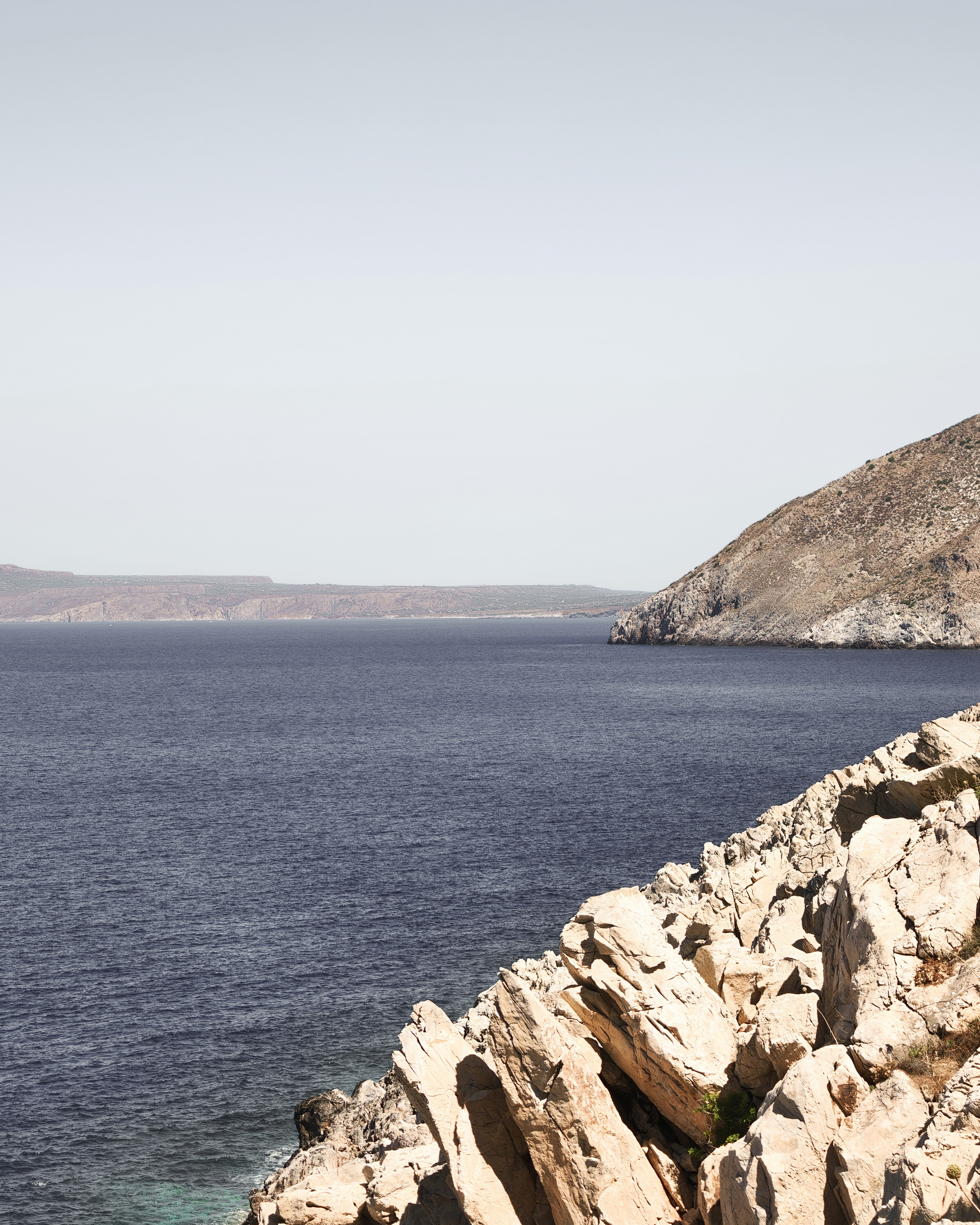 Craggy Peninsula Unlocking a Calm Sea