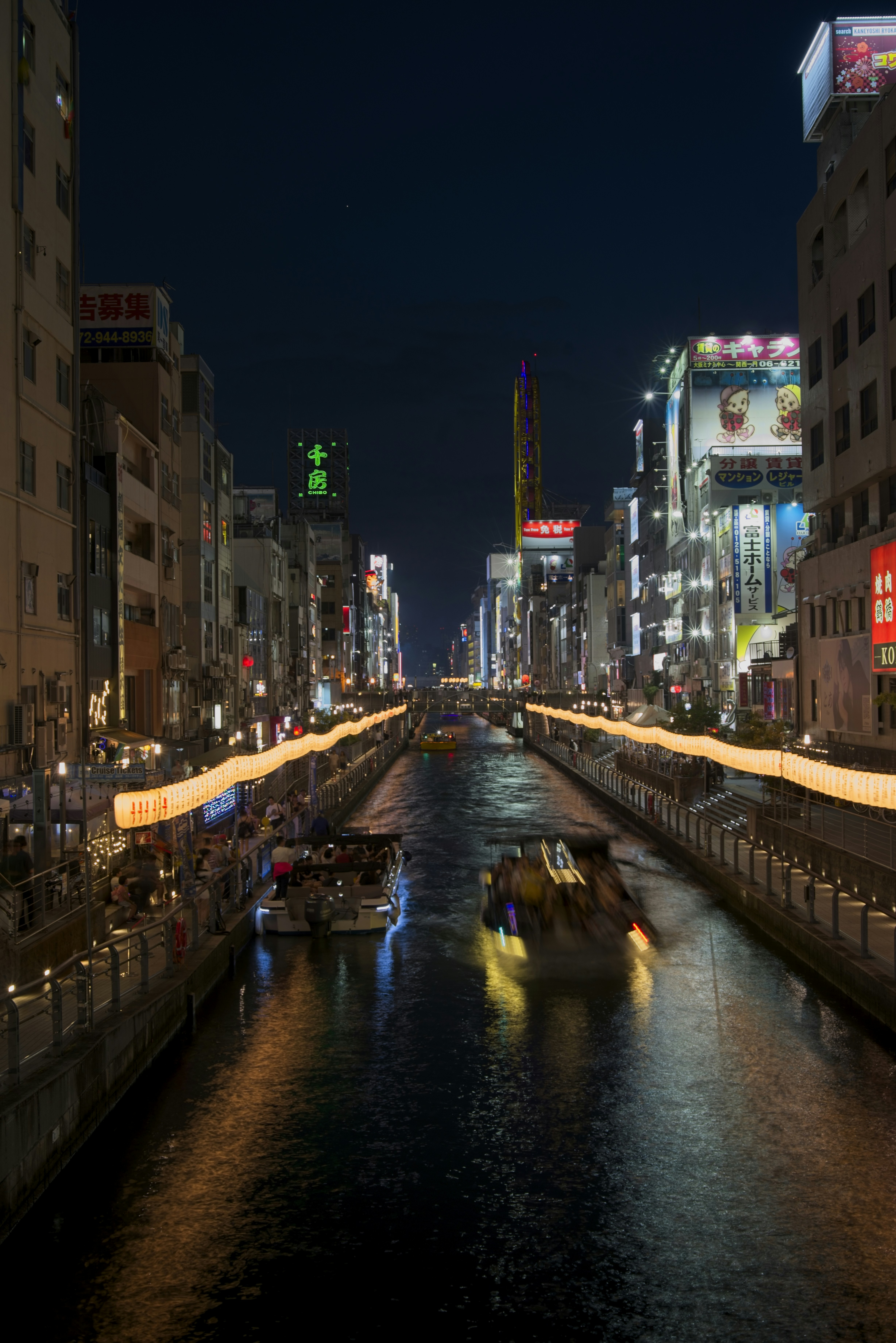 Night Channel: Neon Reflections along a City Waterway