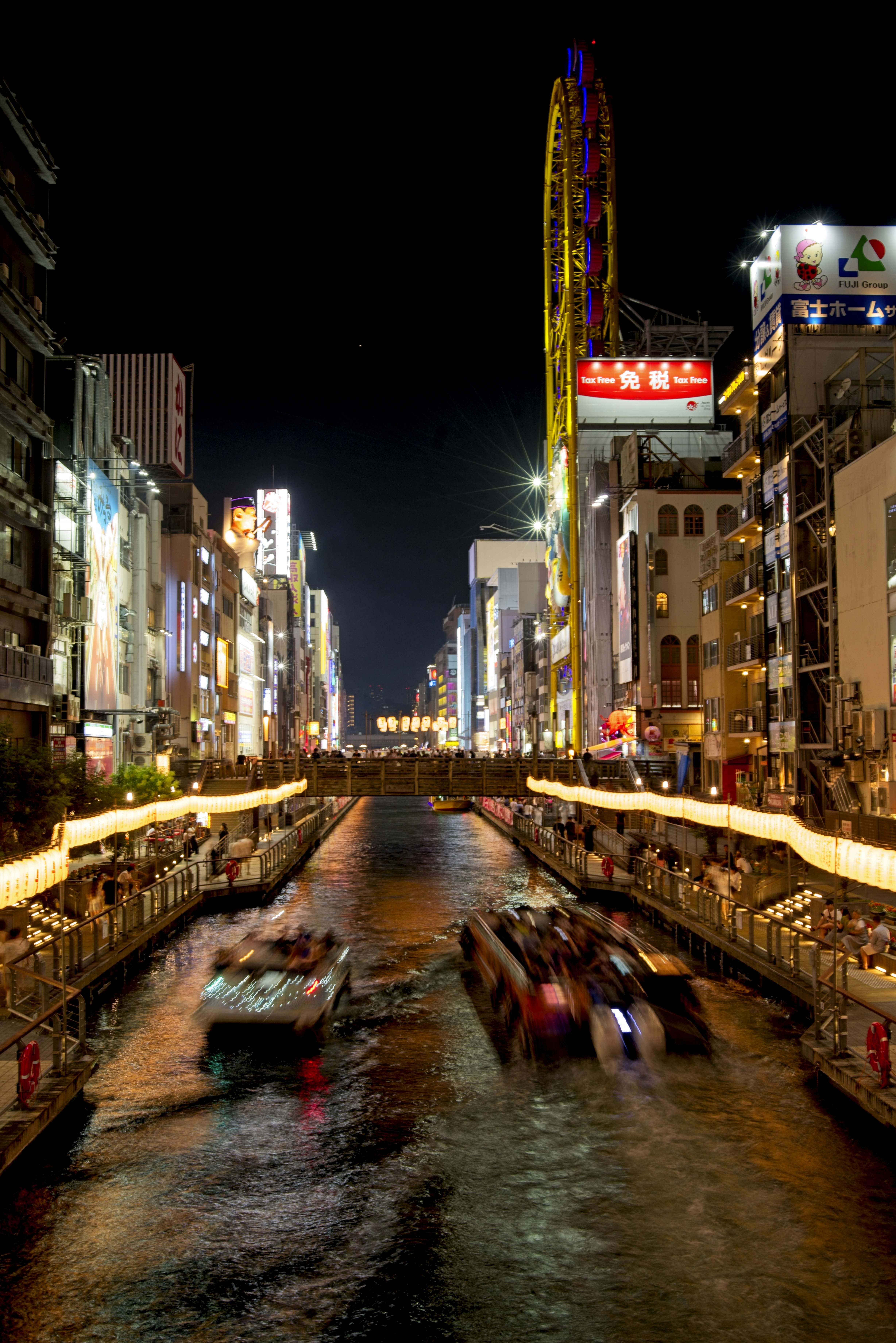 Neon Canal: Nighttime Vibes Along a Bustling Waterway
