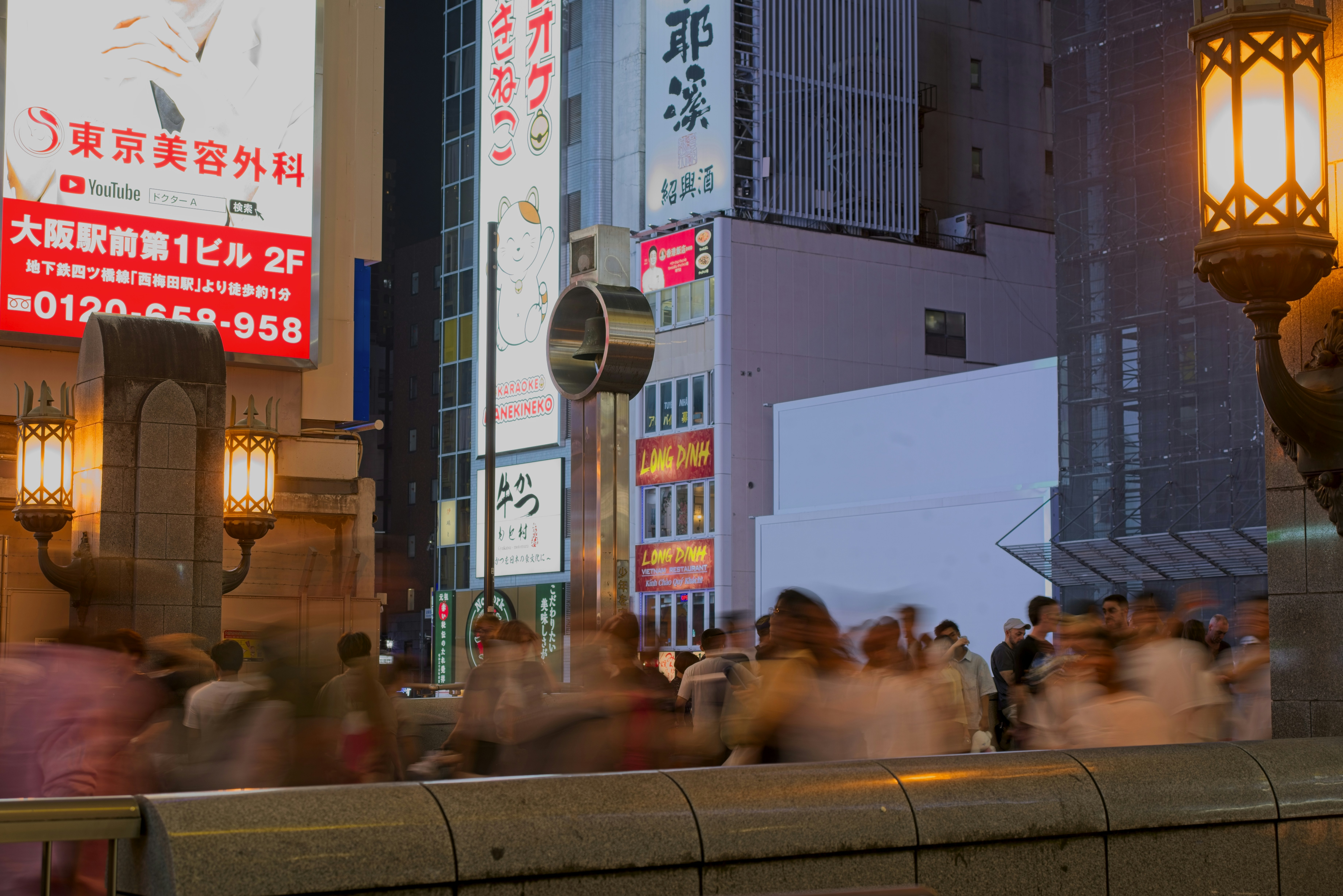 Neon Thrum: Nightlife Blur Across a City Thoroughfare