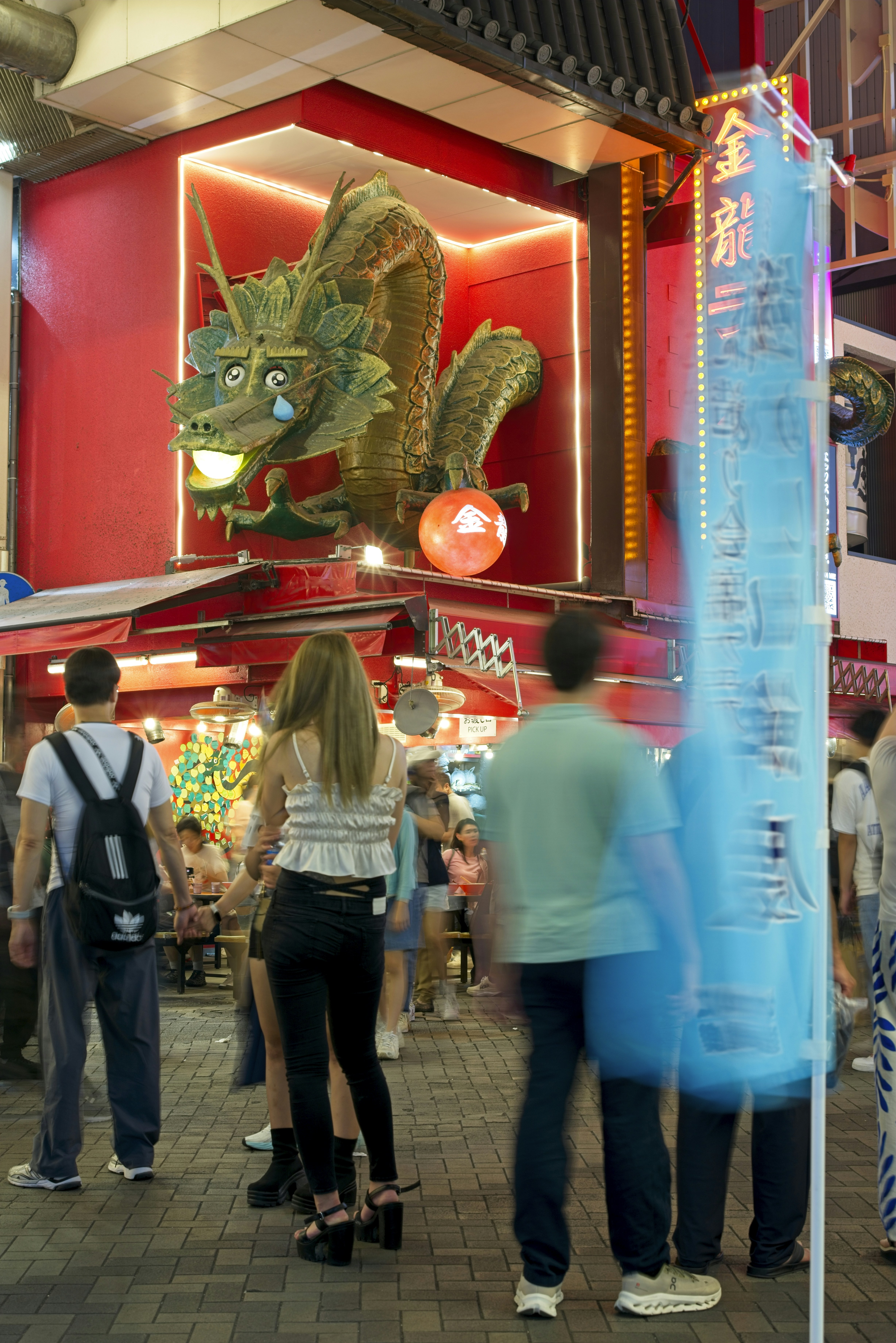 Neon Dragon Over the Bustling Street