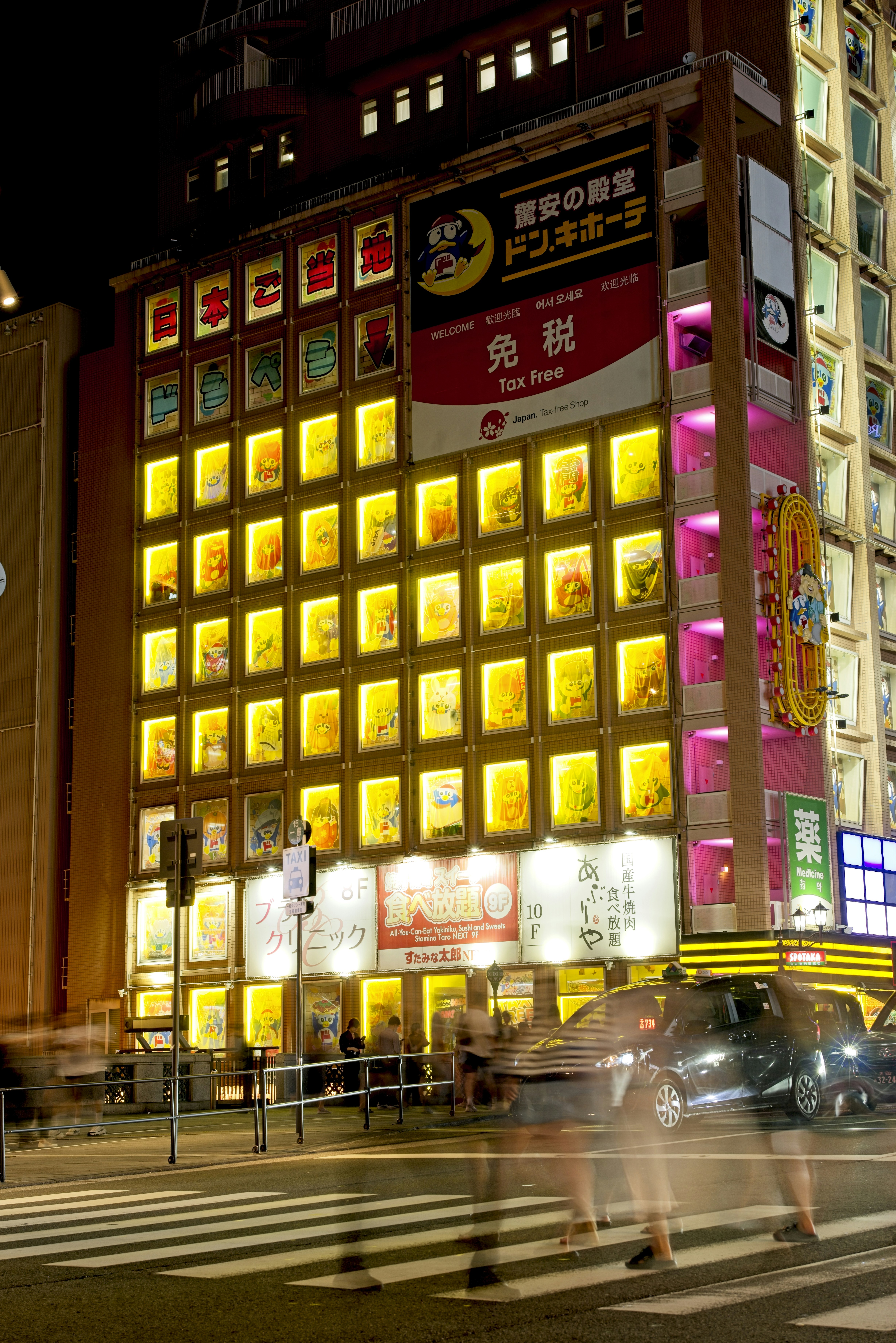 Luminous Facade of a Neon-Glow Street in Tokyo