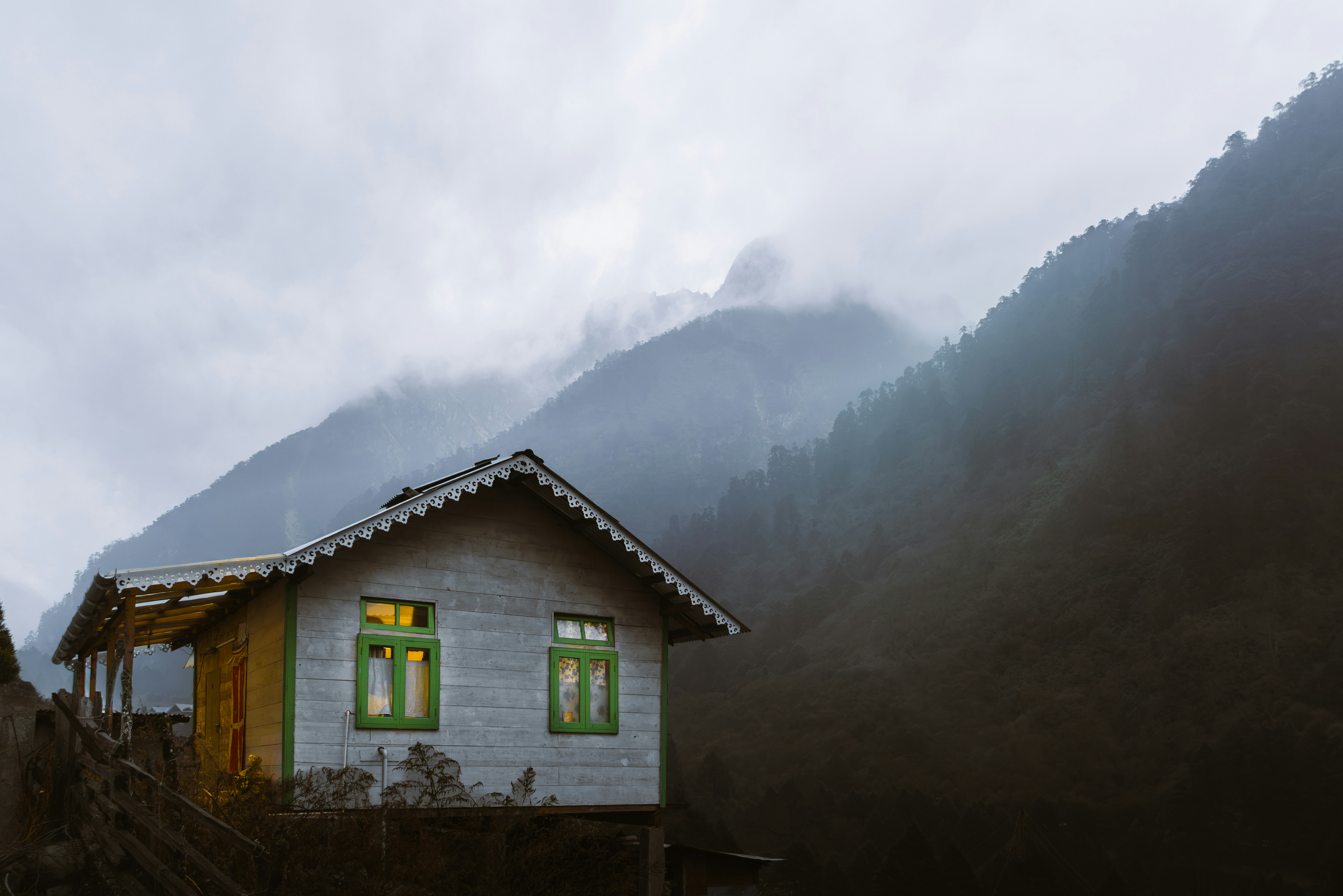 Quiet Mountain House Rising Above the Mist