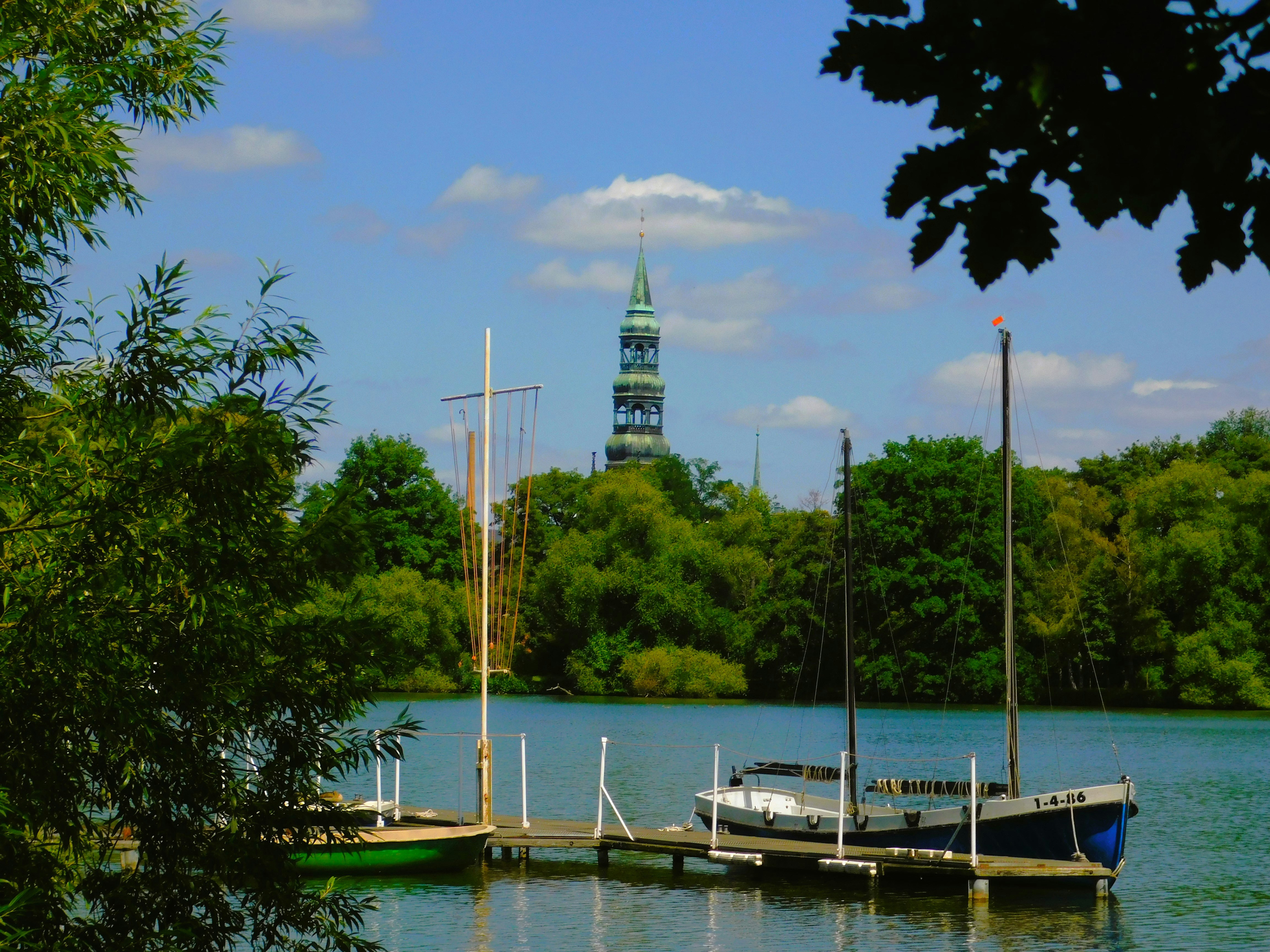 Towered Beacon Across a Serene Lakeside