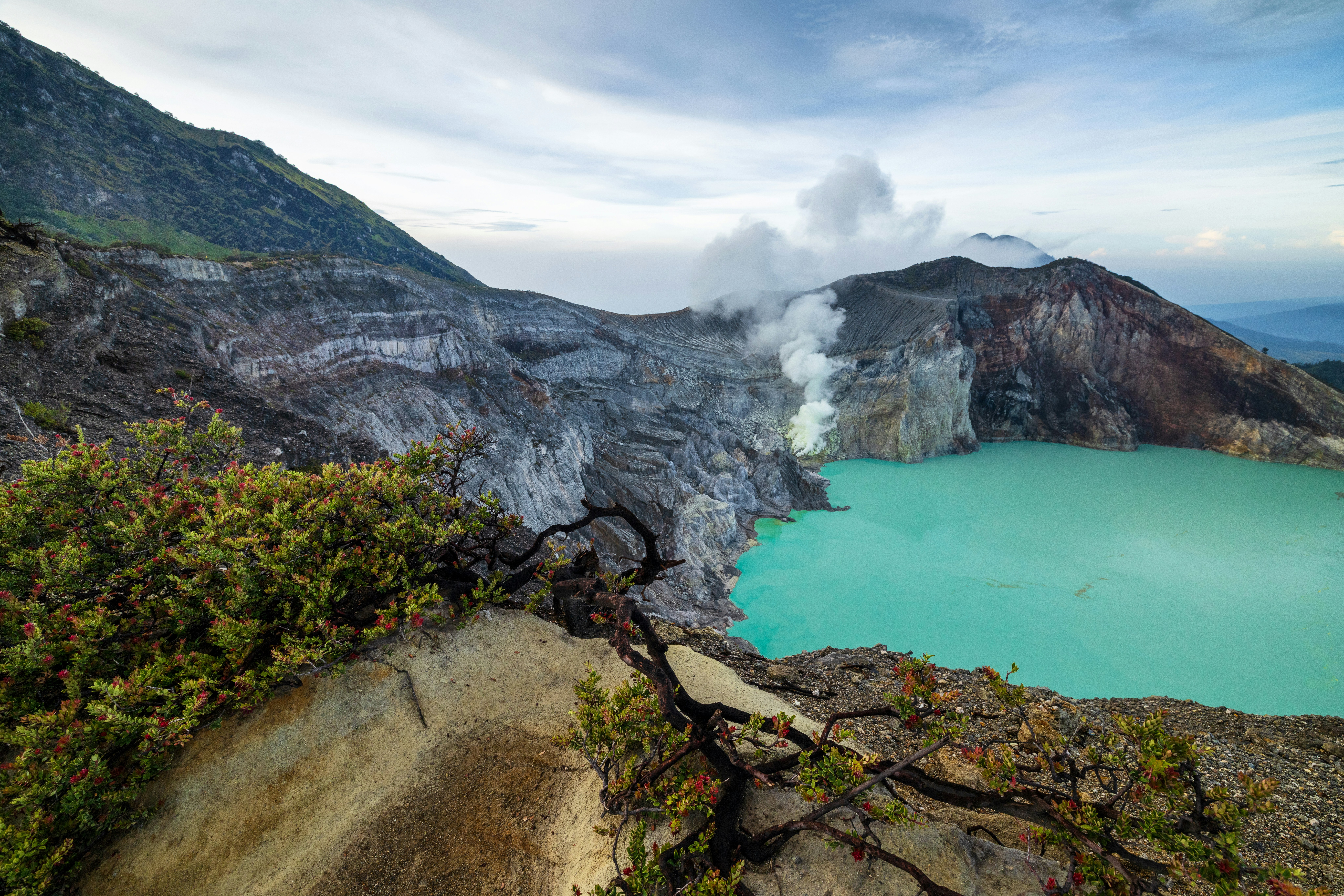 Emerald Crater: Turquoise Lake at the Rim of a Volcanic Caldera