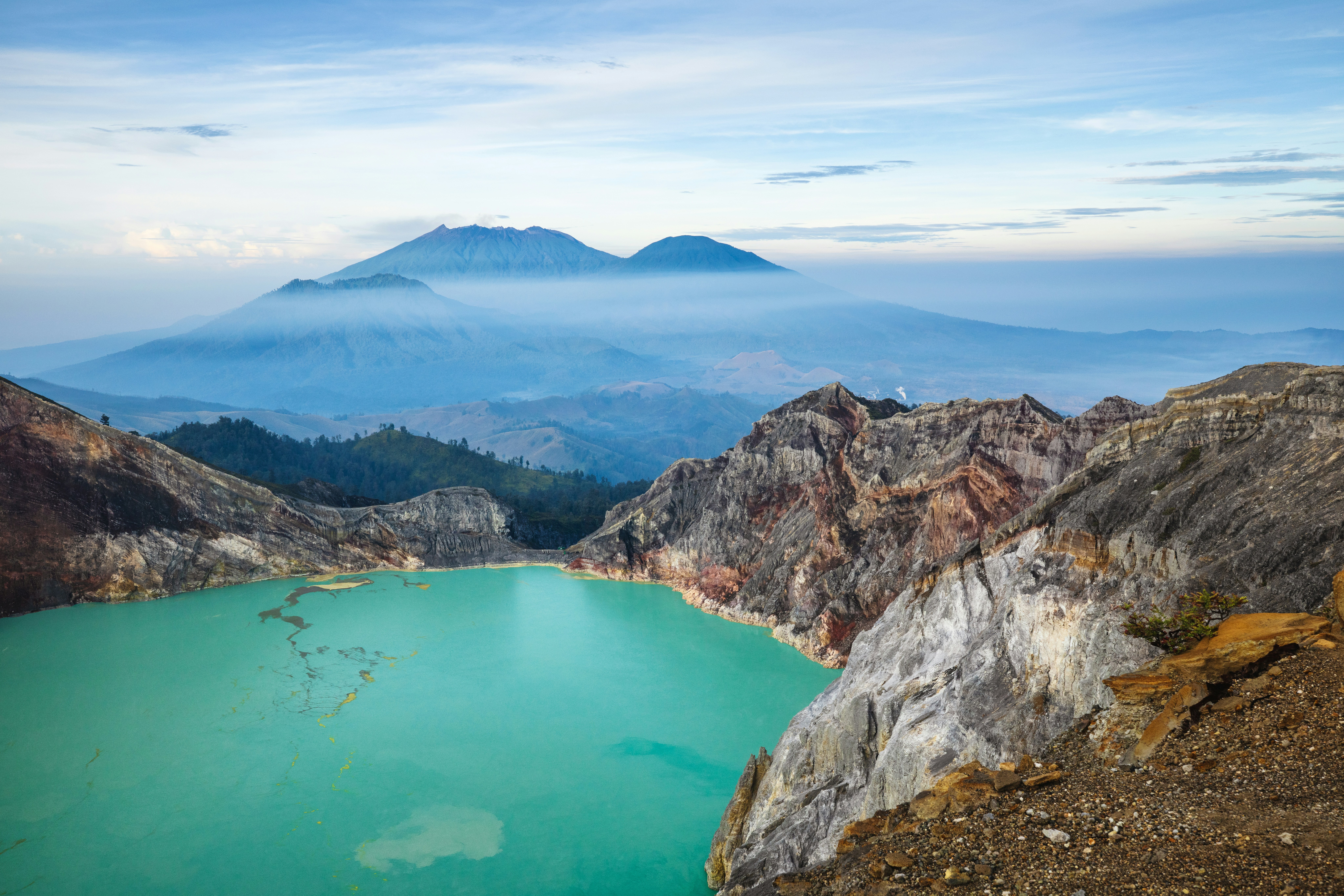 Emerald Crater at Dawn: Turquoise Lake within A Terraced Caldera