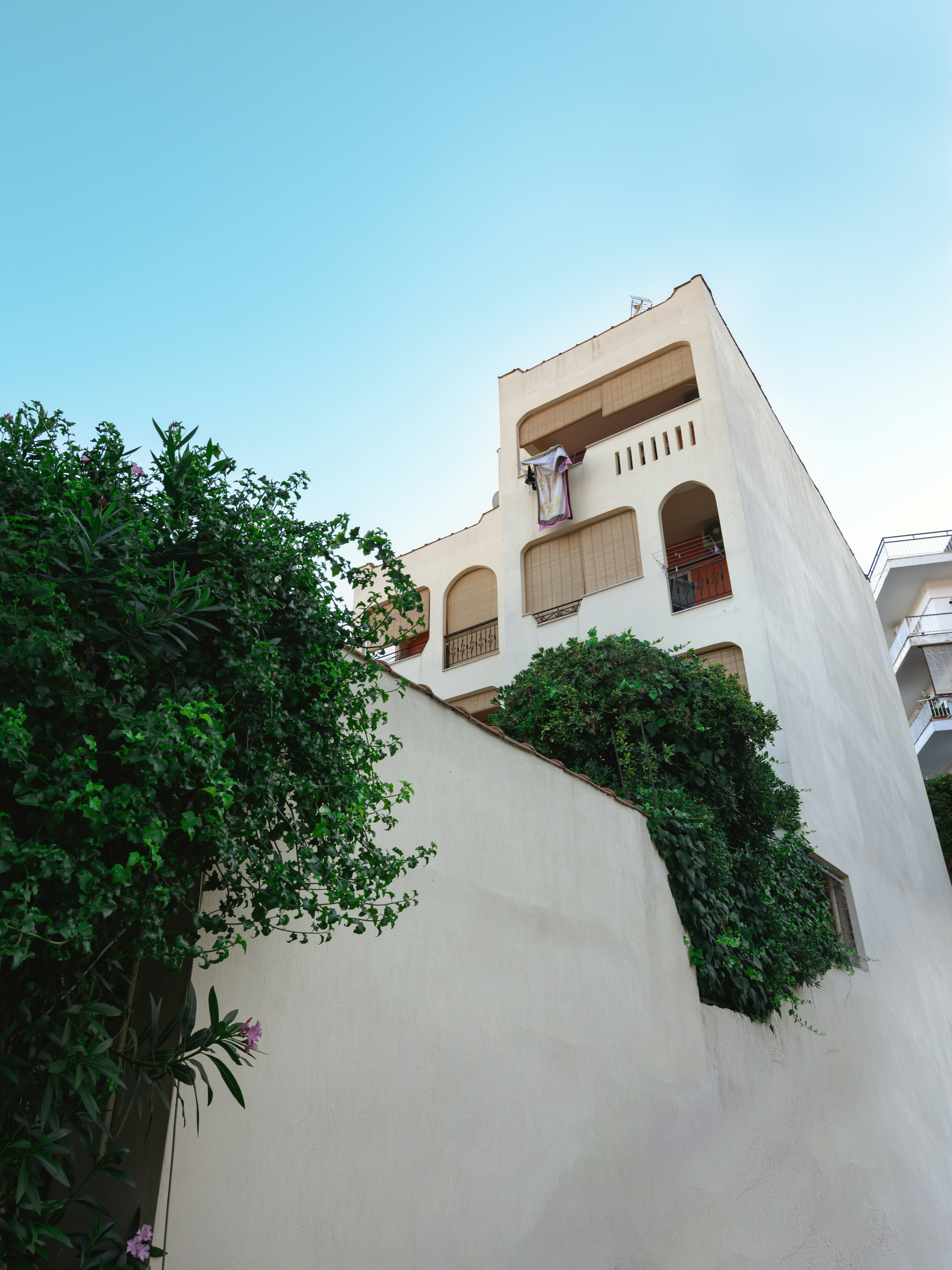 Sunlit Mediterranean Courtyard Tower Steps