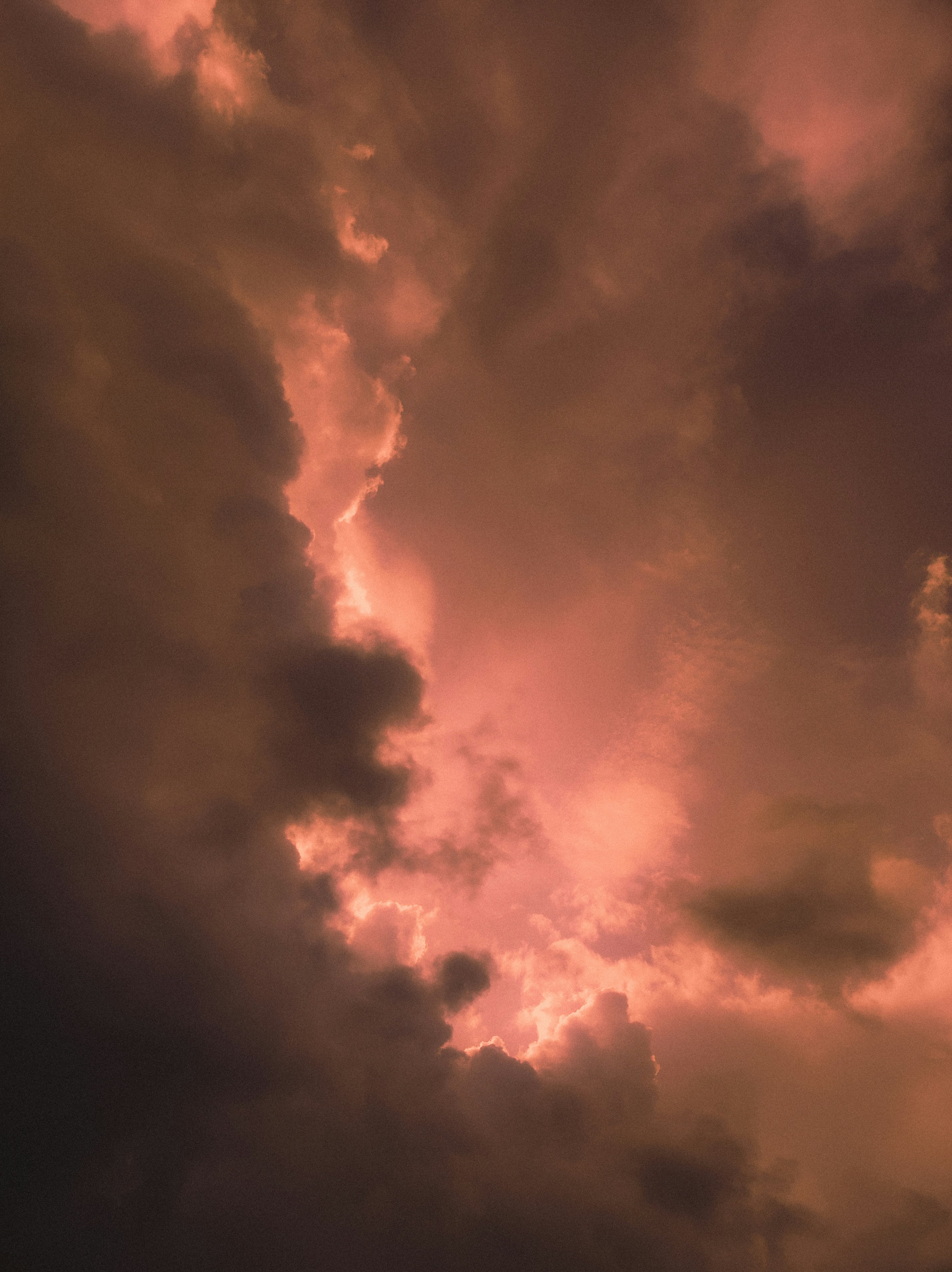 Emerald Ember Skies: A Migrant Sunrise in Copper Clouds