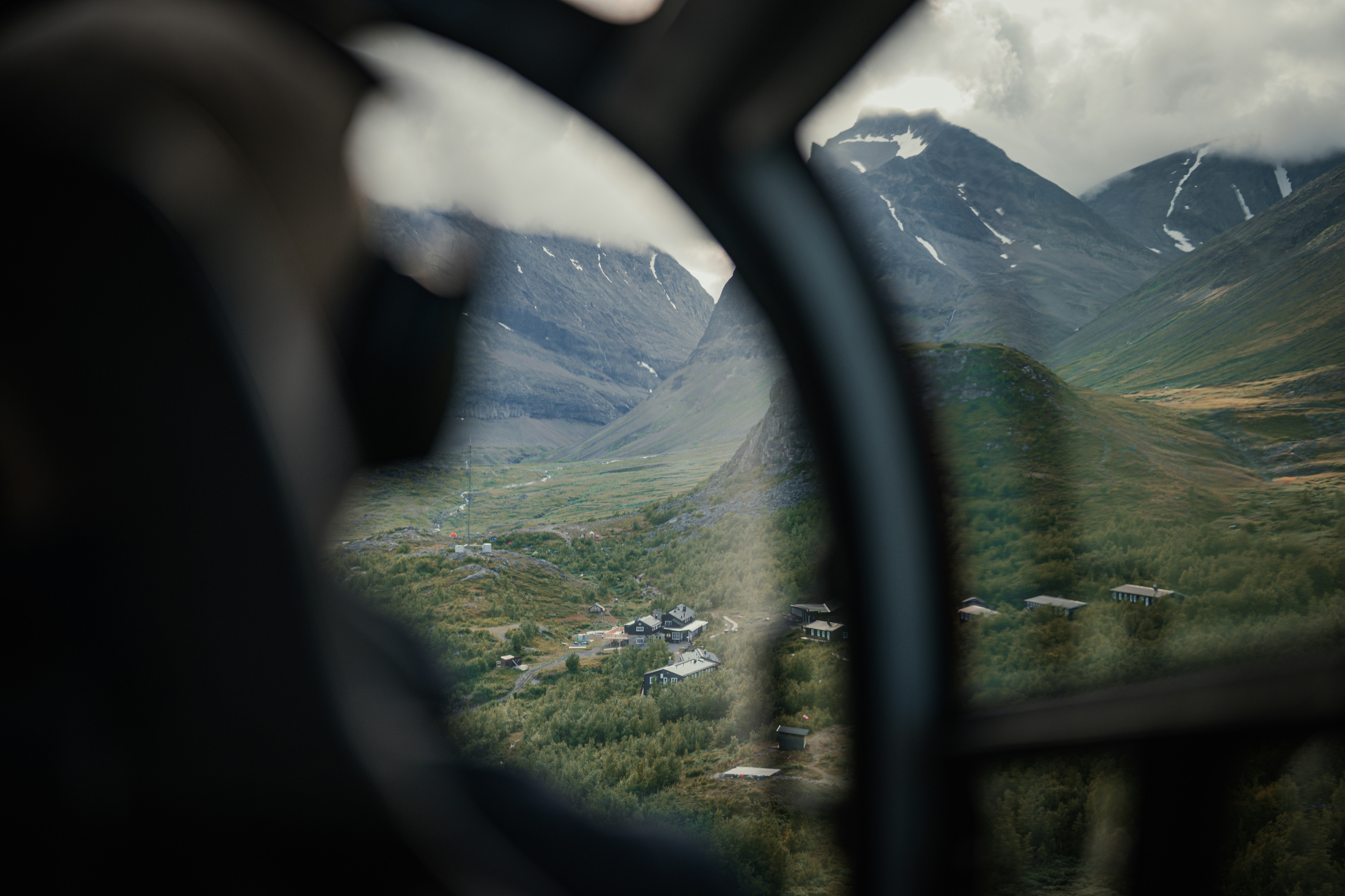 Rear-Seat Panorama: Mountains Framed by a Car Window