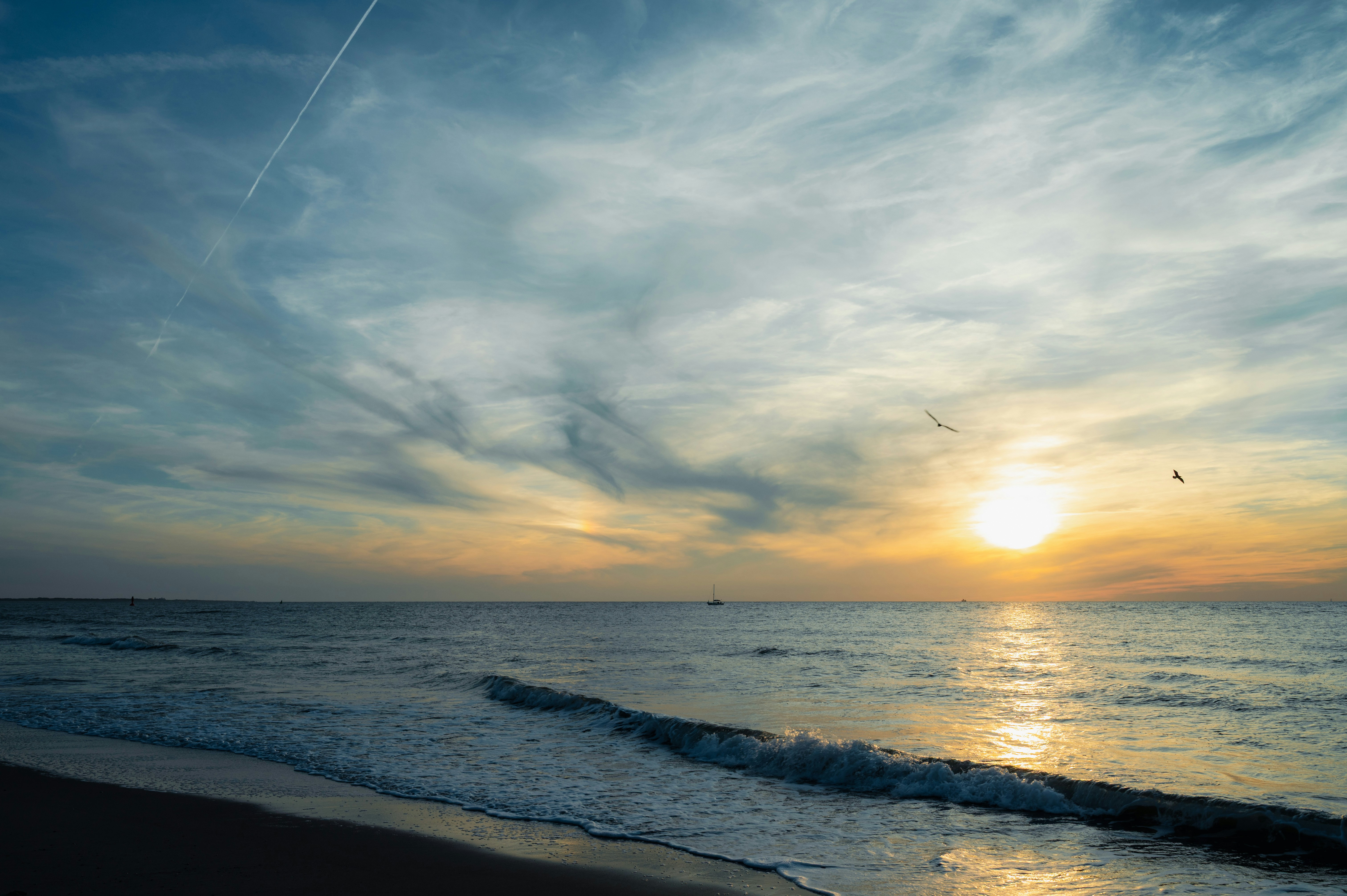 Sunlit Crest: A Quiet Horizon Over Quiet Seas