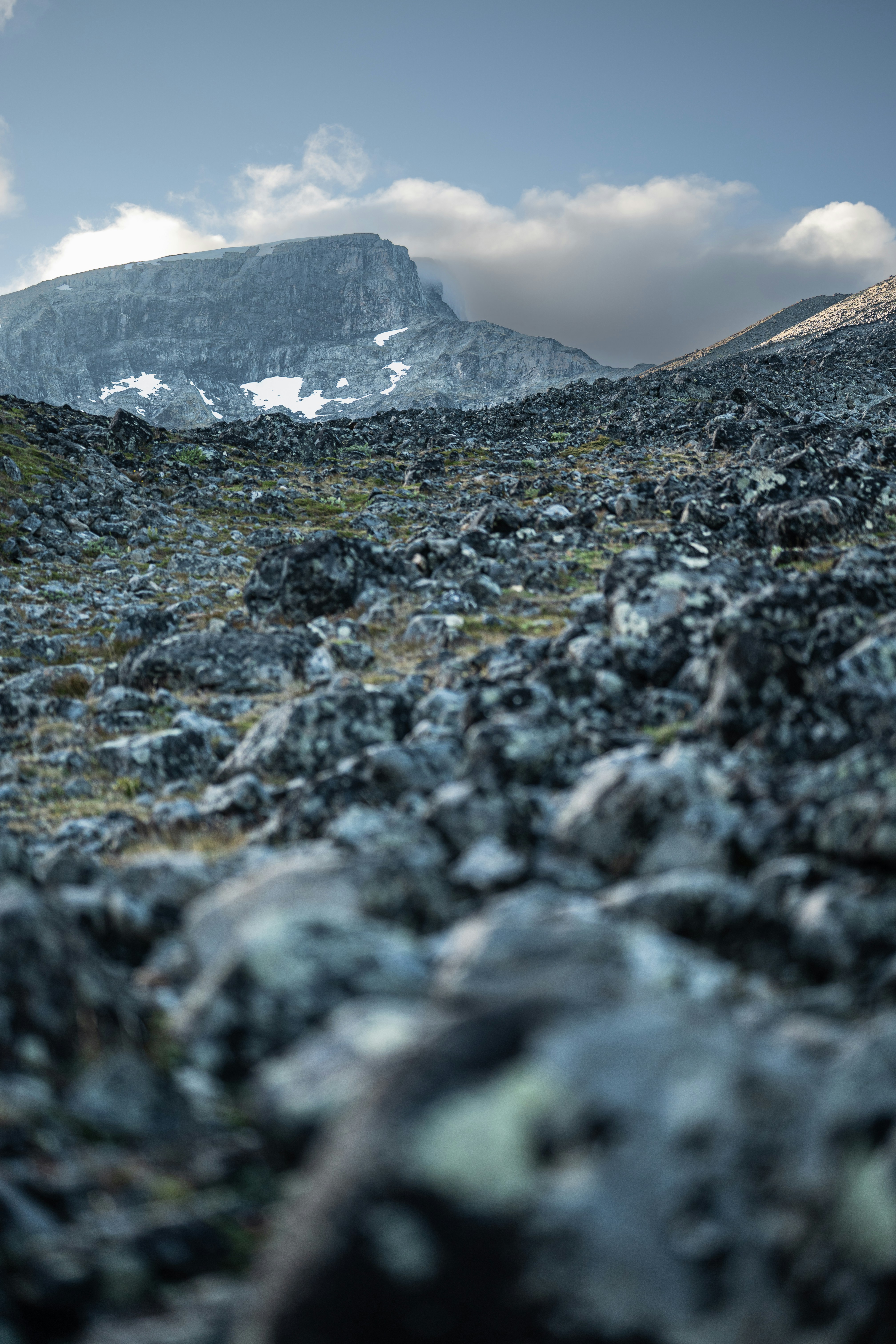 Moonlit Ridge: A Rugged Path Toward Snow-dusted Peaks