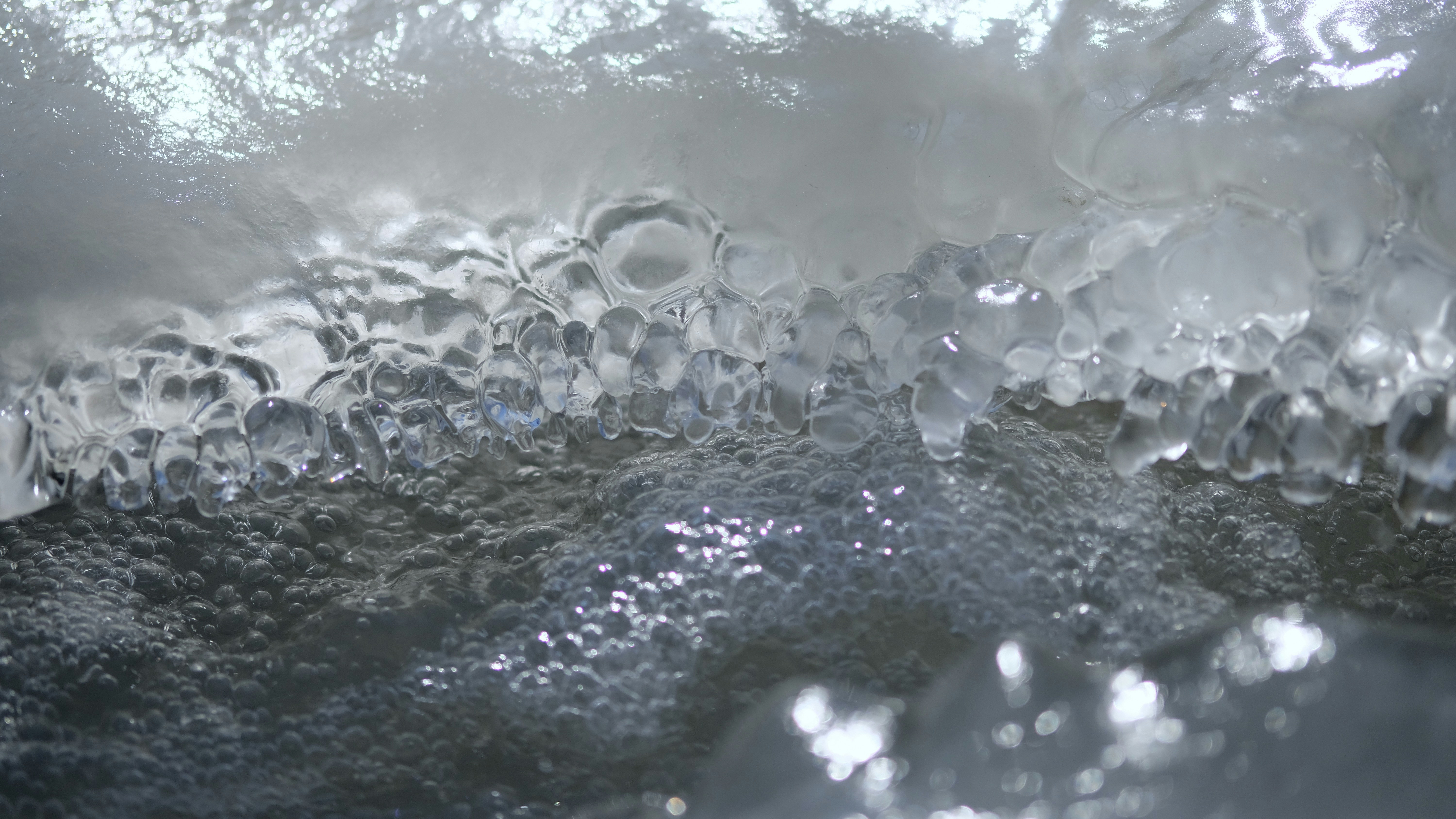 Fractured Currents: Close-Up of Ice-Bed Ripples