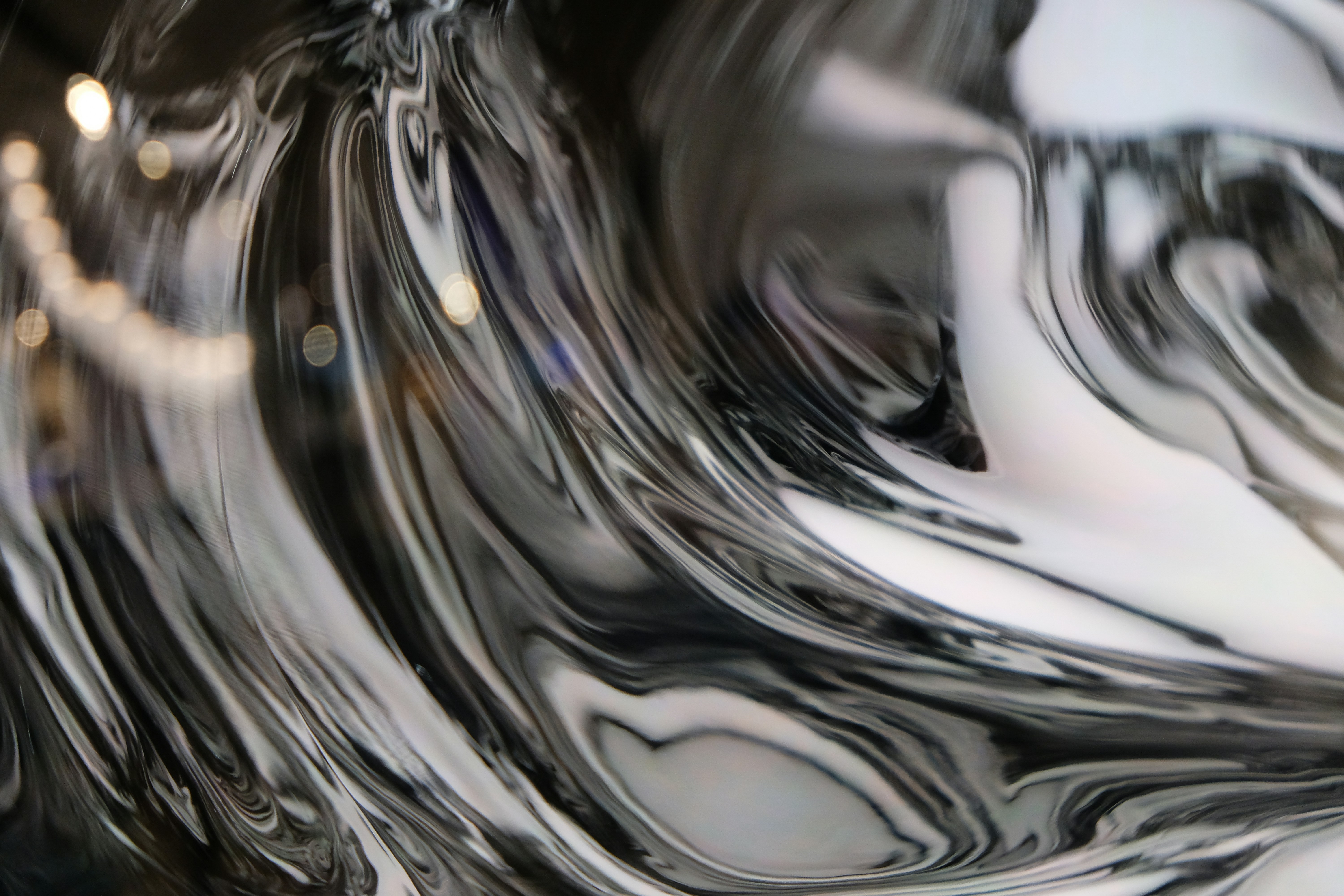 Liquid Mirage: A Fractured Flow of Light and Shadow