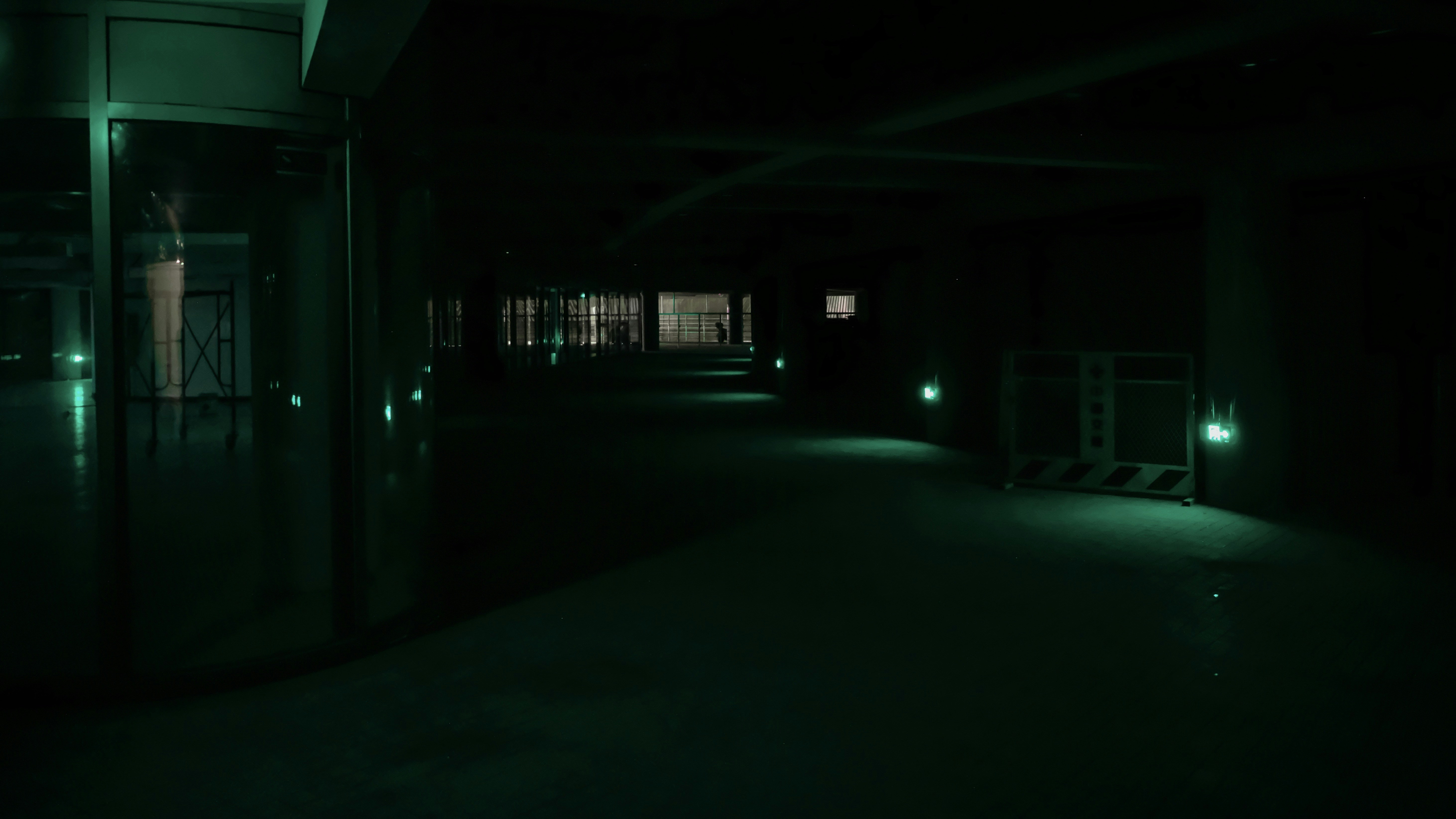 Green-lit Silence in an Underground Atrium