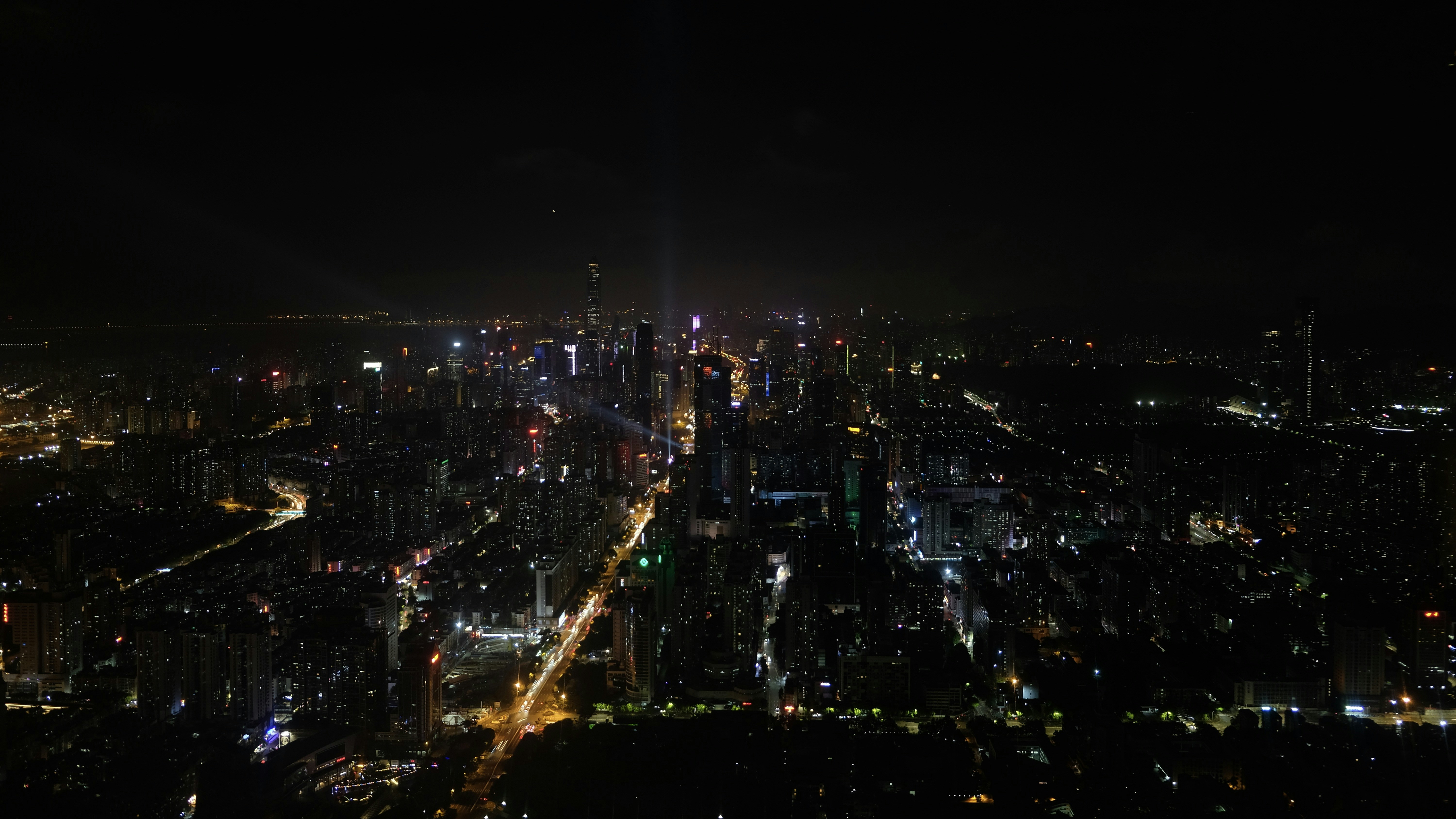 City Pulse After Dusk: A Web of Neon and Traffic