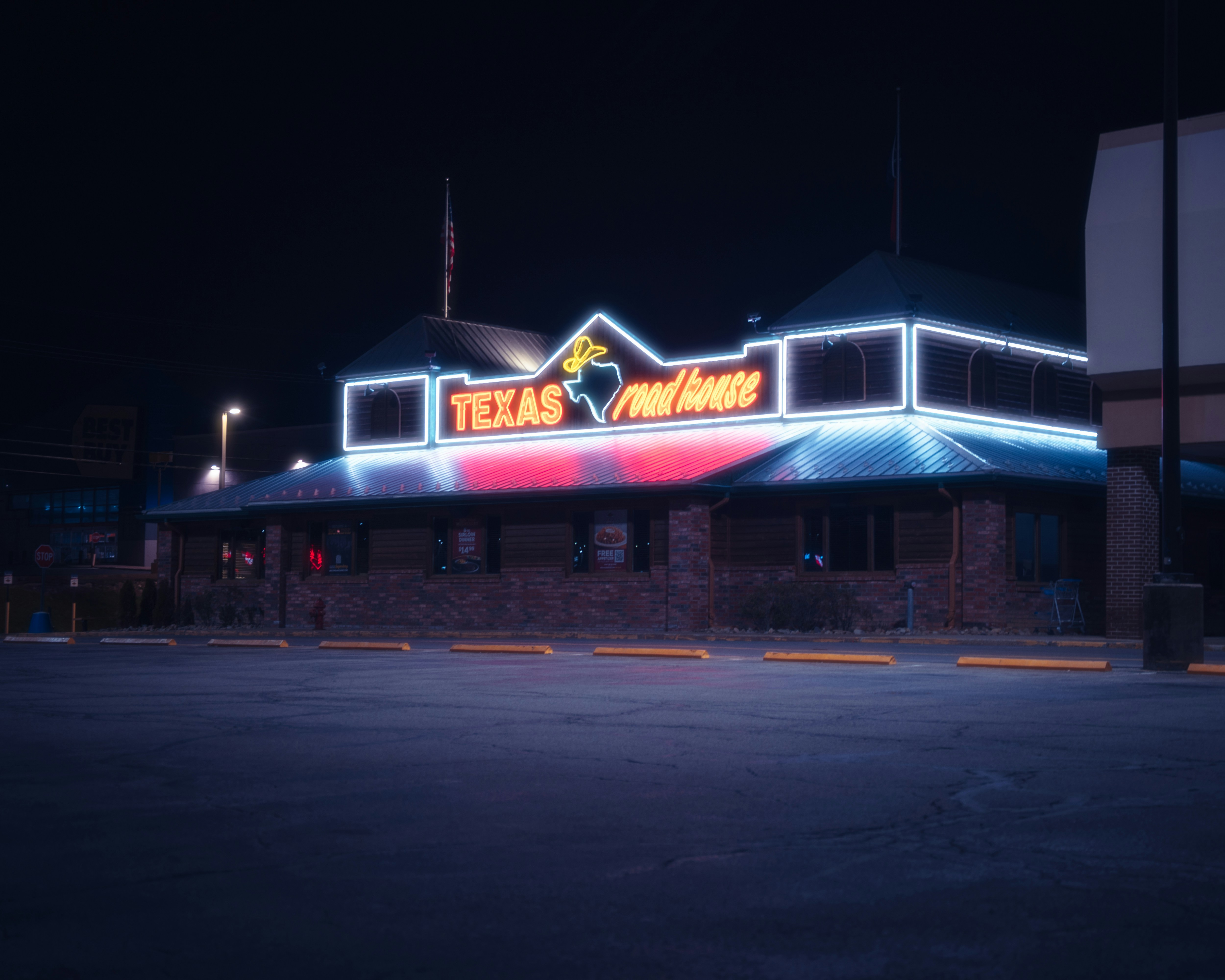 Neon Glow Over a Lone Texas Roadhouse at Night