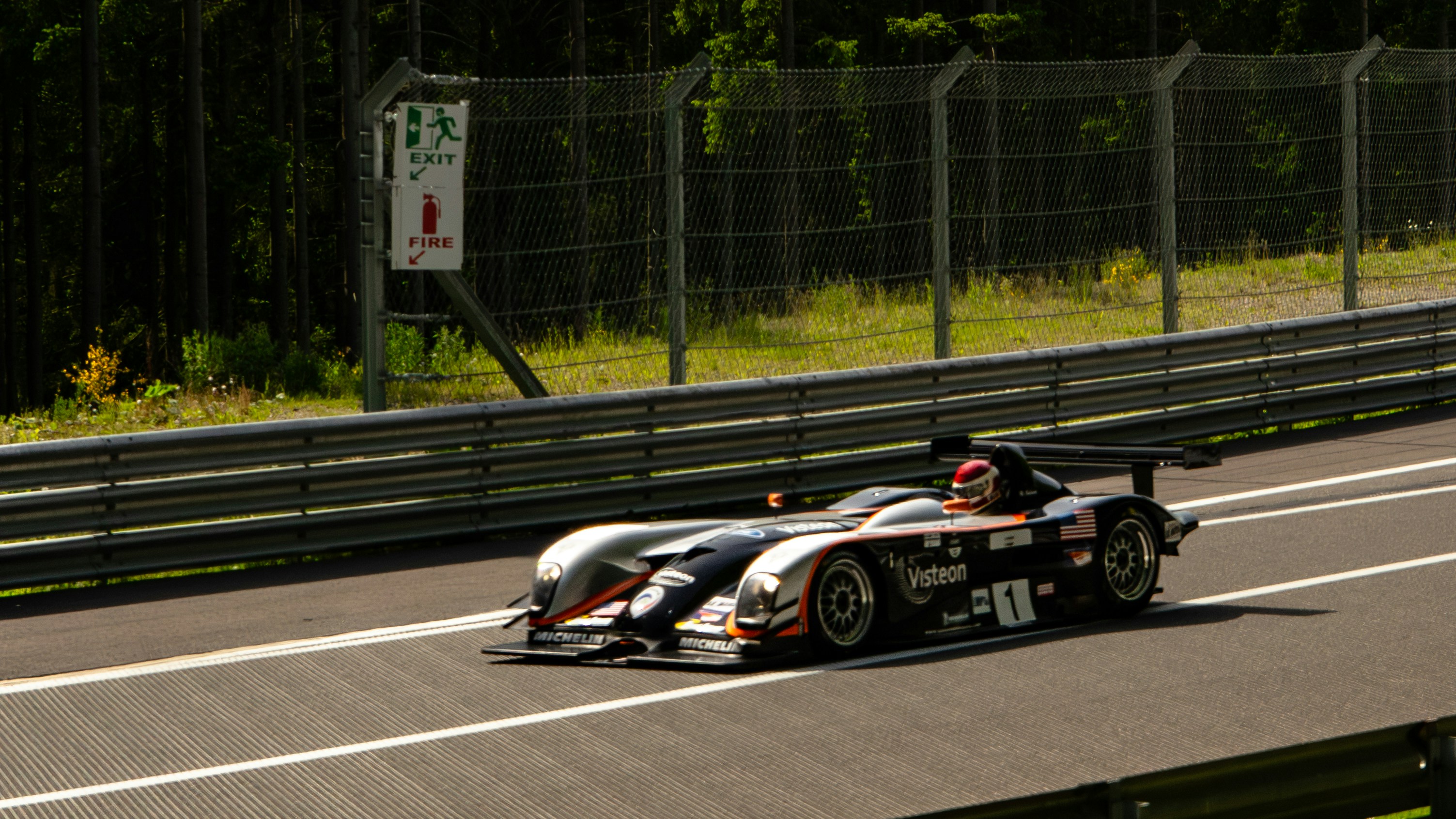 Low-slung racer carving the track: a moment of precision and speed