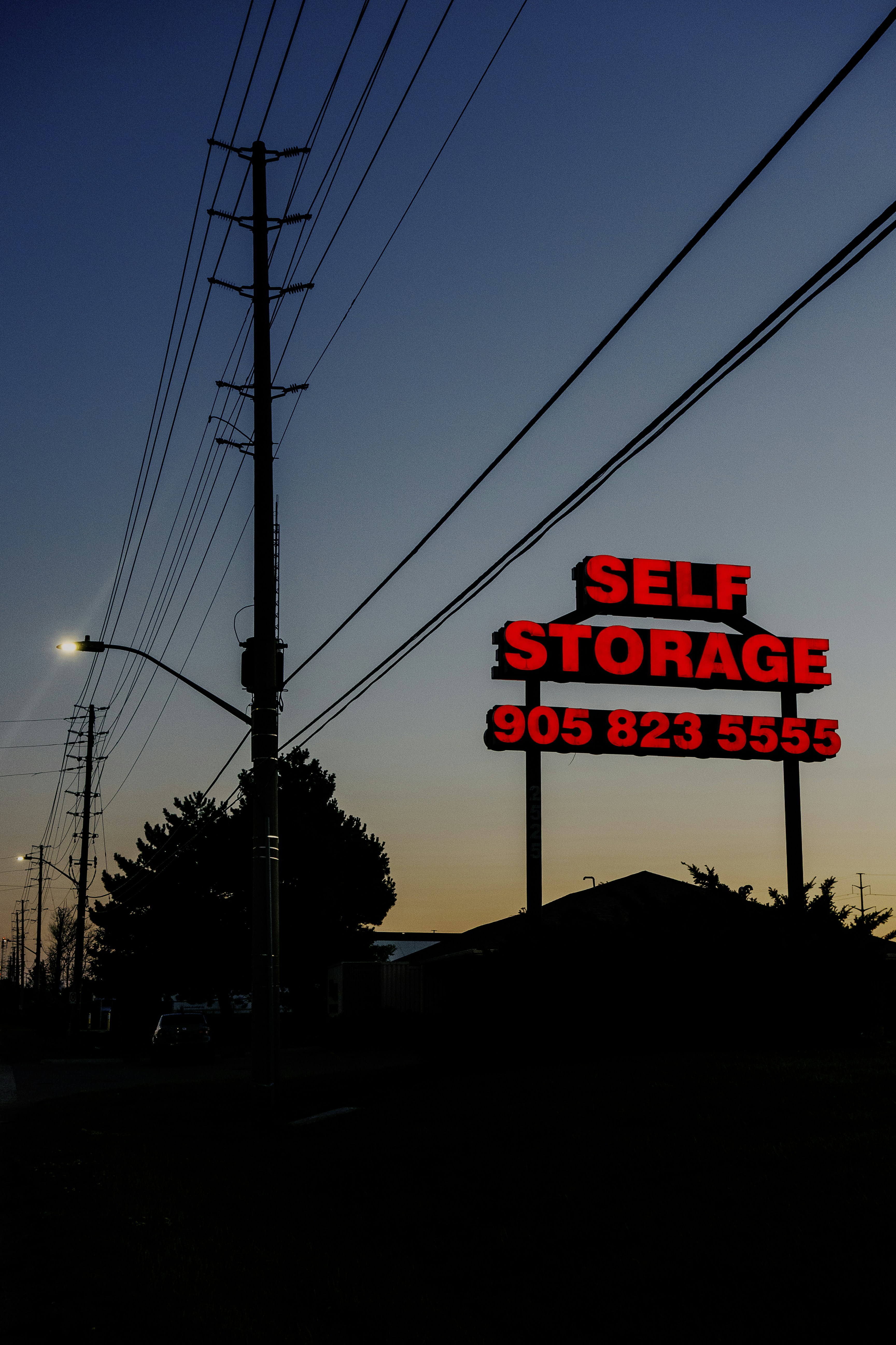 Neon Sign Casting Redlight Over Sunset Street