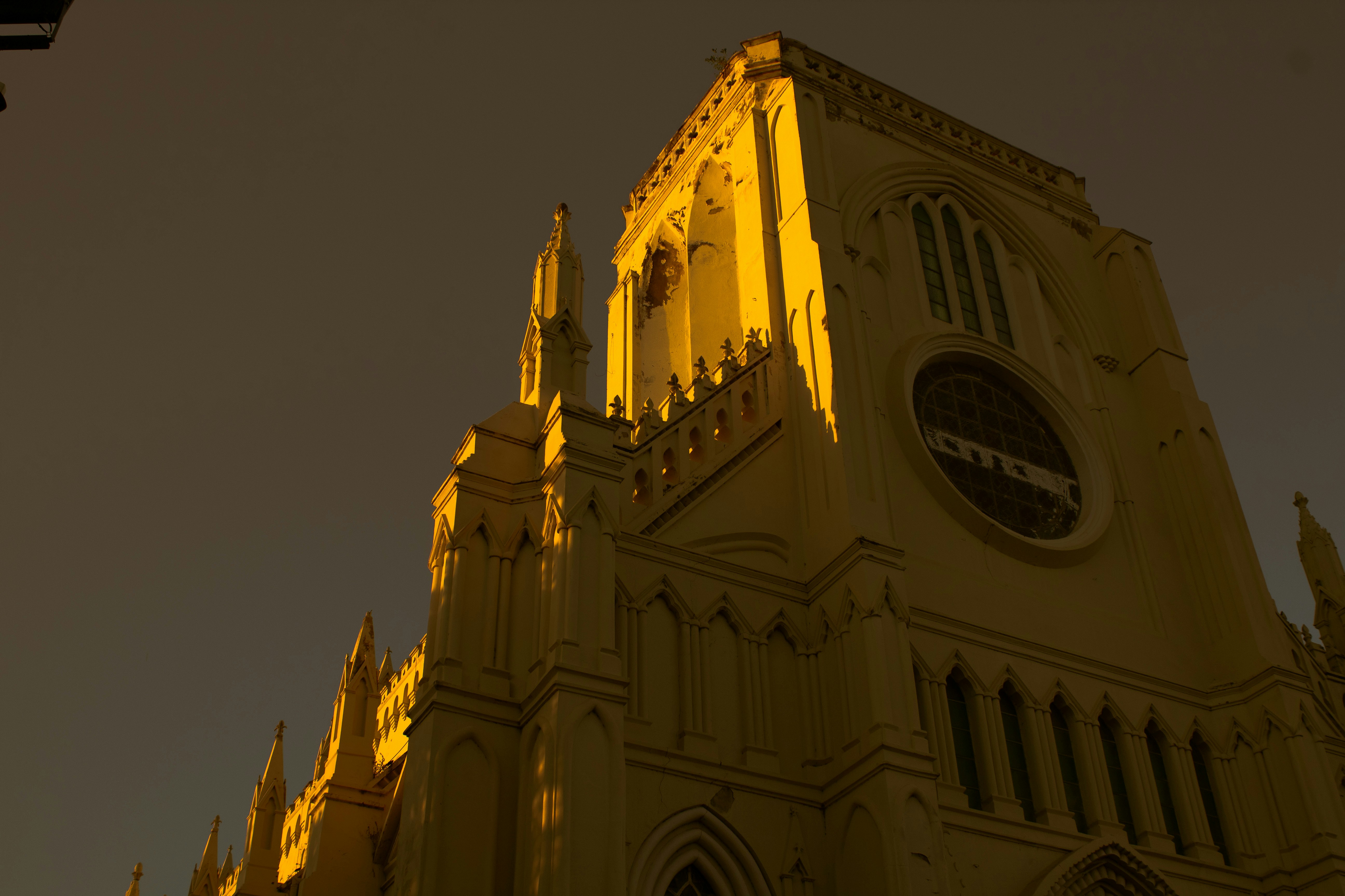 Golden Cathedral: Sunset Illumination on Gothic Facade