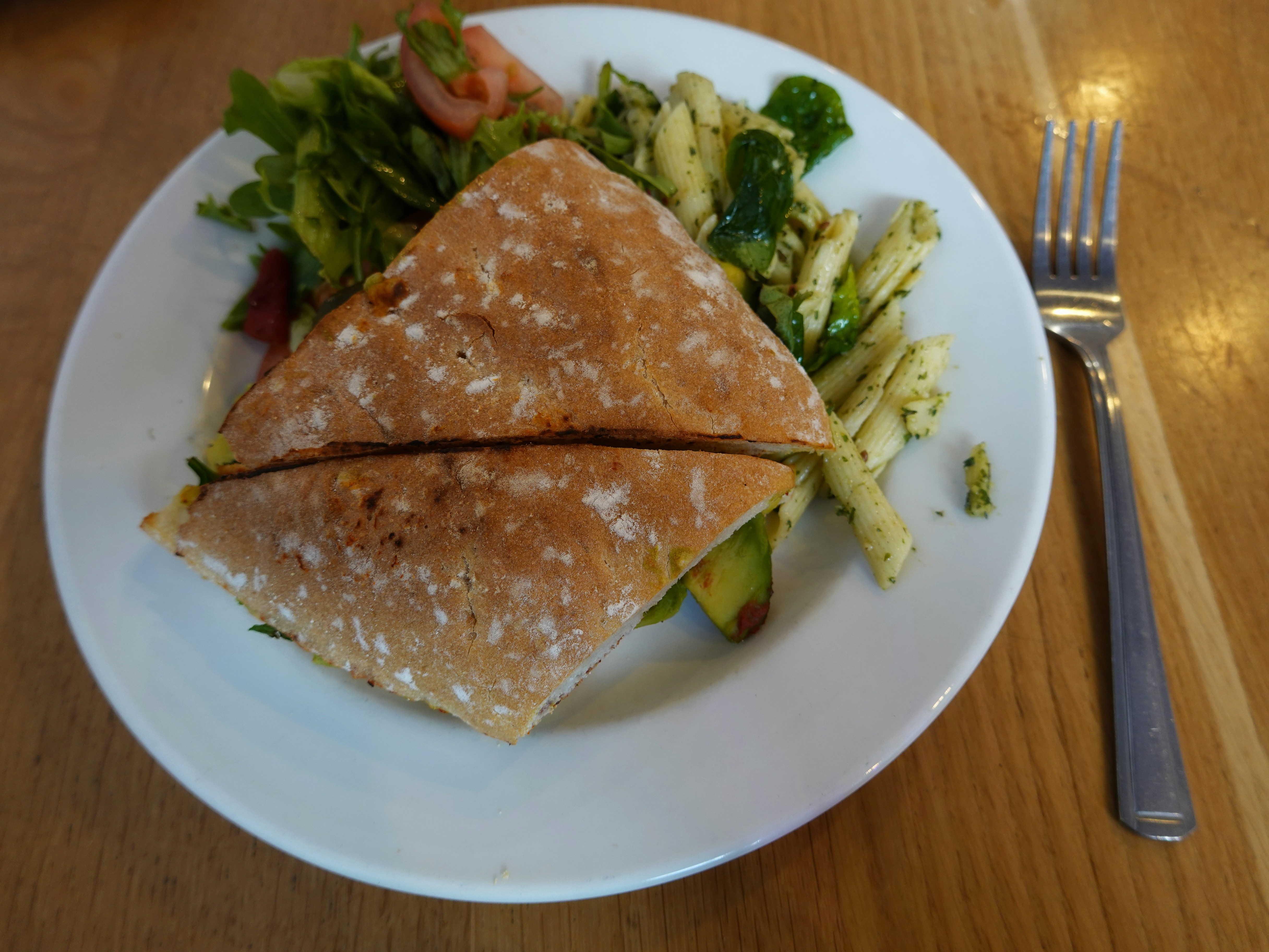Golden Panini Anchor: A Lunch Plate Framed by Silverware