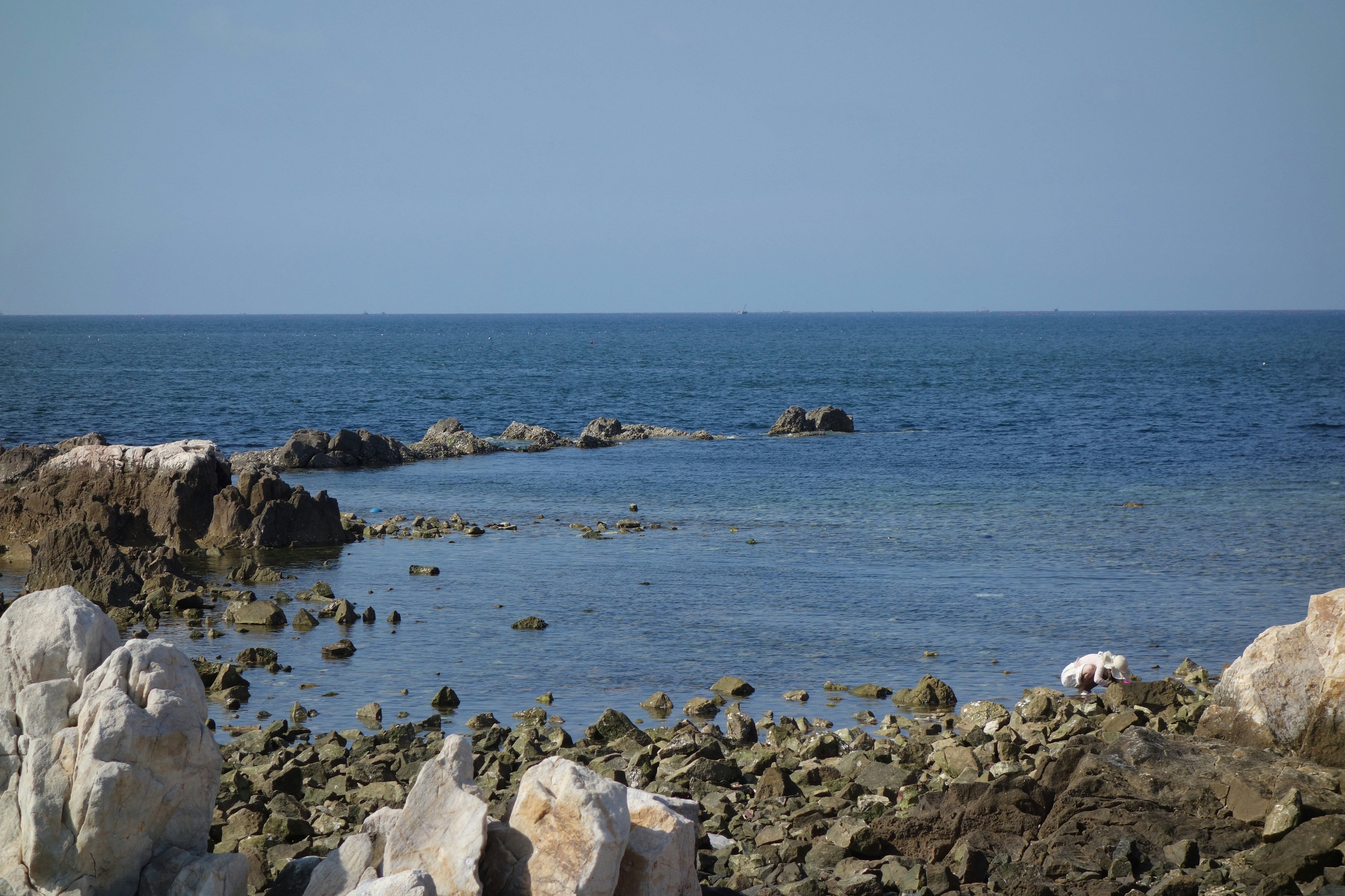 Rugged Seashore: Rocks Meeting the Calm Atlantic