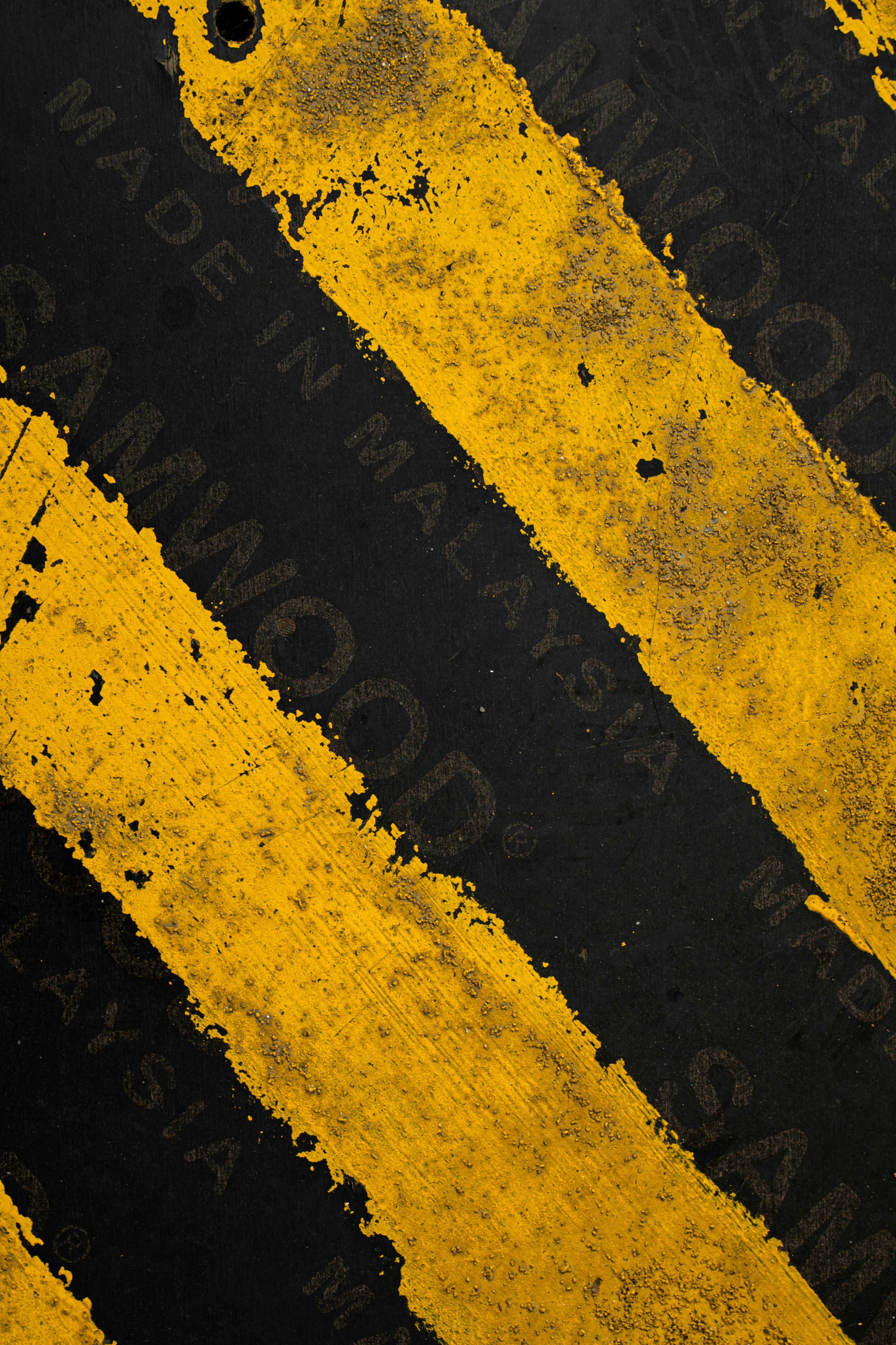 Industrial Yellow Stripes Across a Dark Canvas