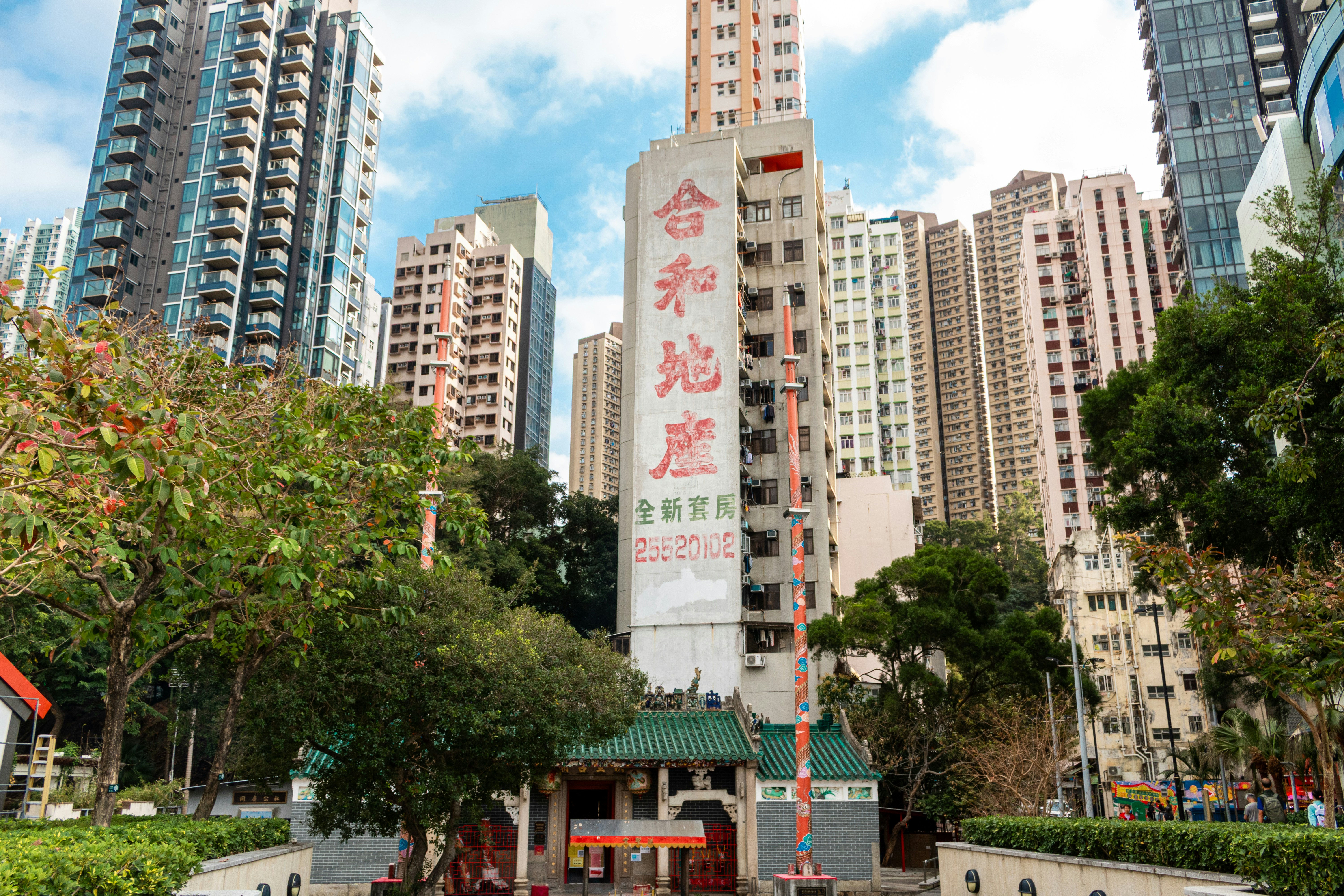 Vertical City Gate: A Towering Monument Among Skyscrapers