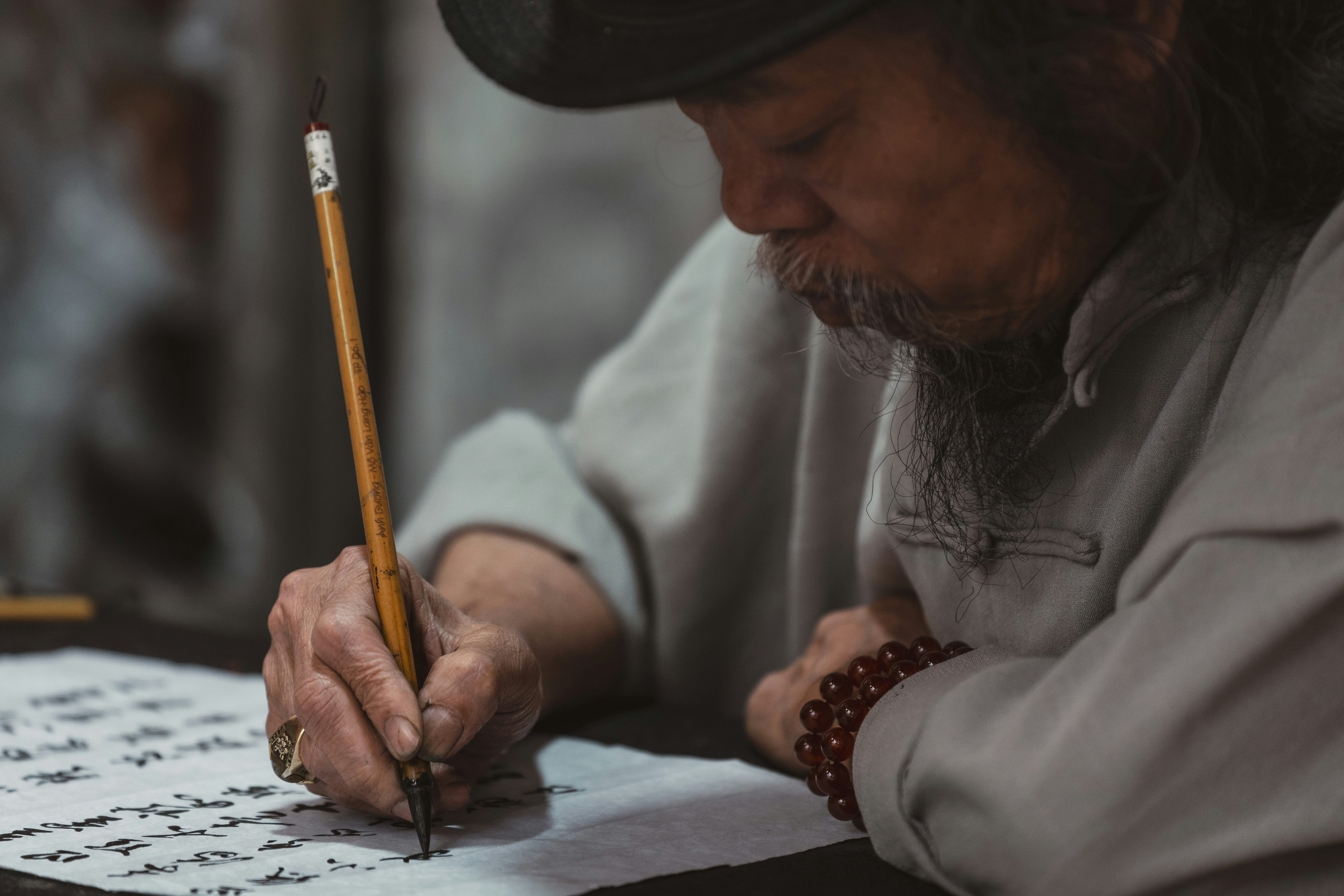 Brush of Focus: A Calligrapher’s Quiet Moment