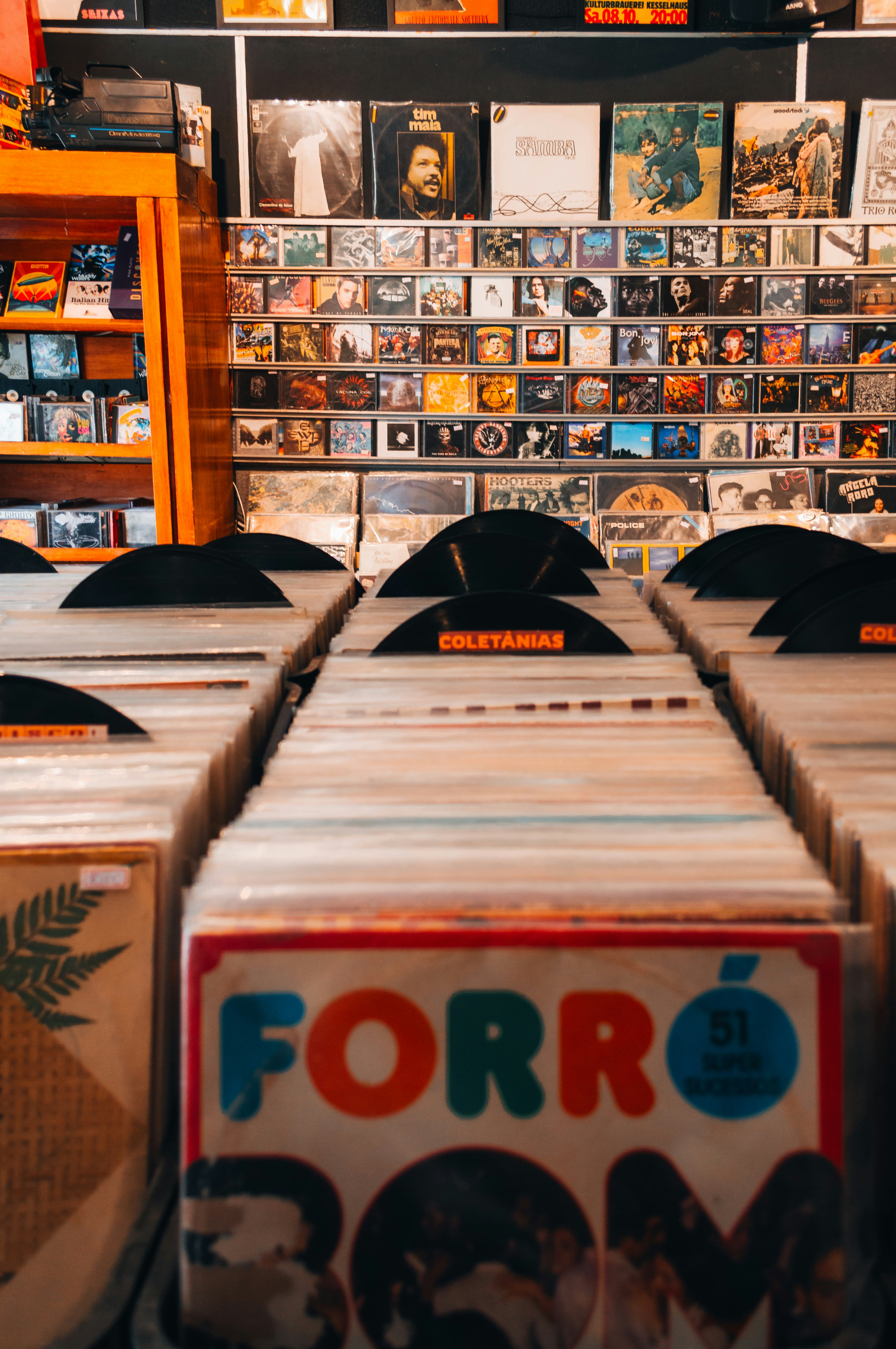 Vinyl Aisle: A Sea of Album Covers in a Record Store Shelf