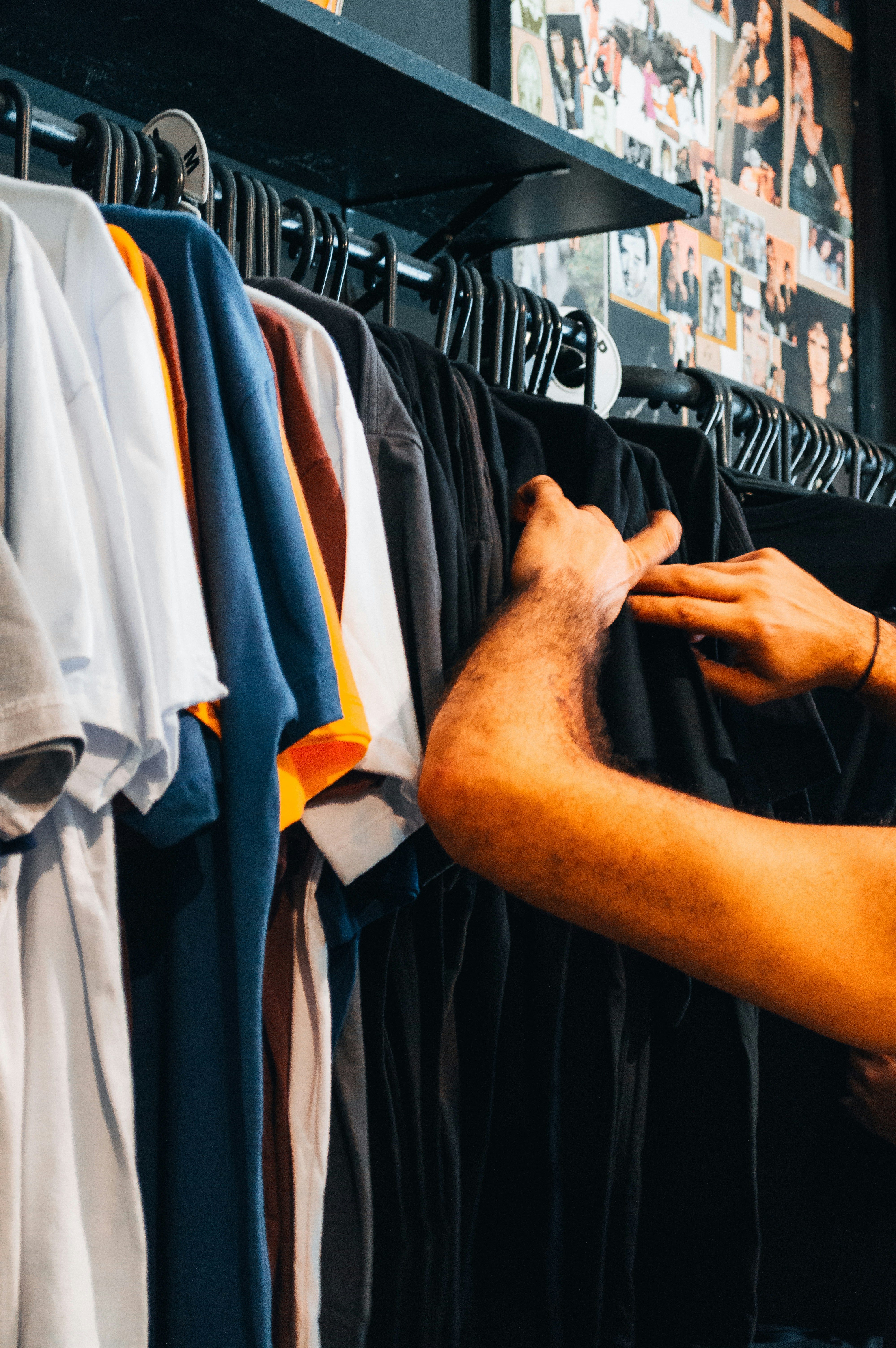 Clothing Rack Conductor: A Handful of Garments on the Verge of a Purchase