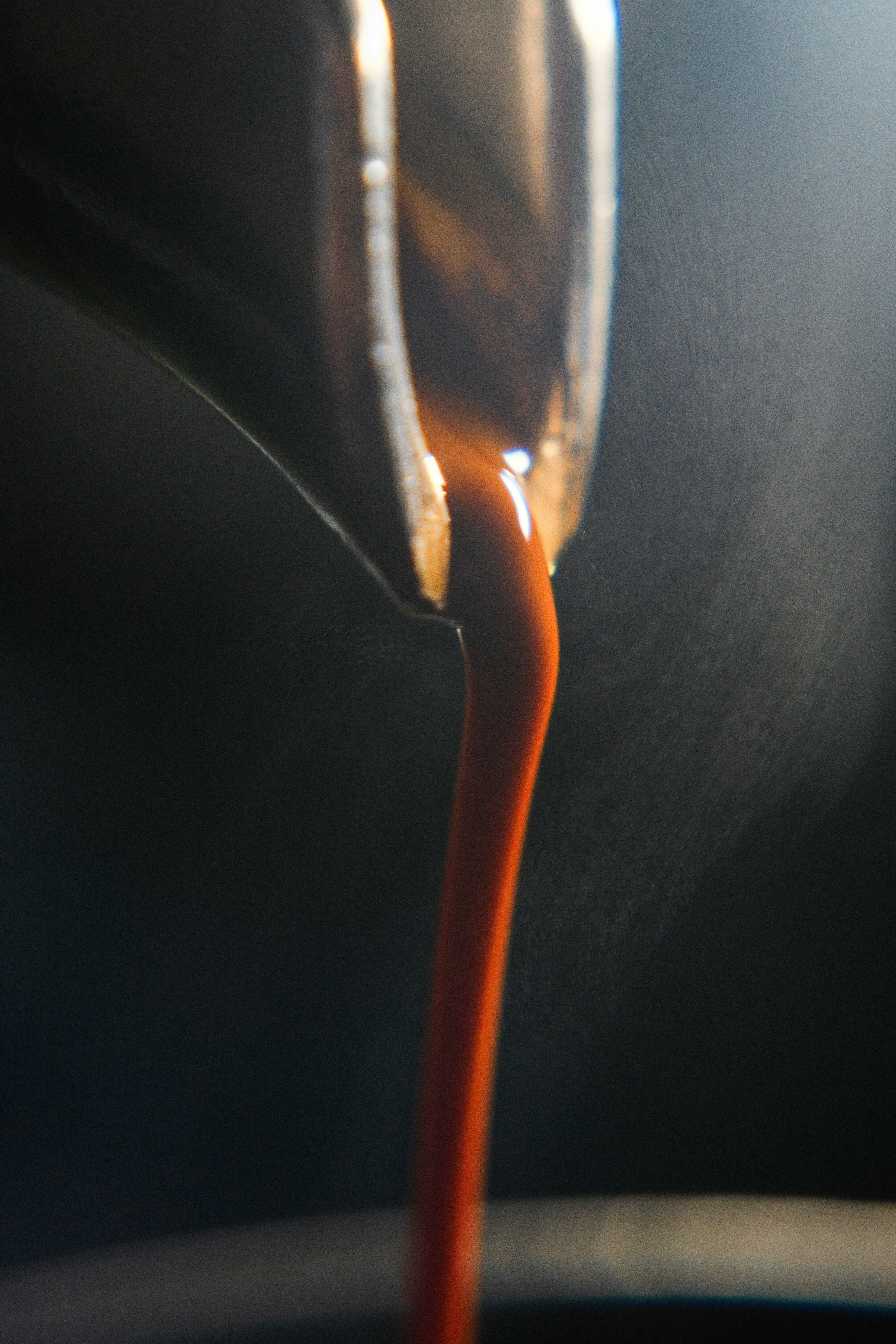 Liquid Copper: A Drip of Lighting from a Spout