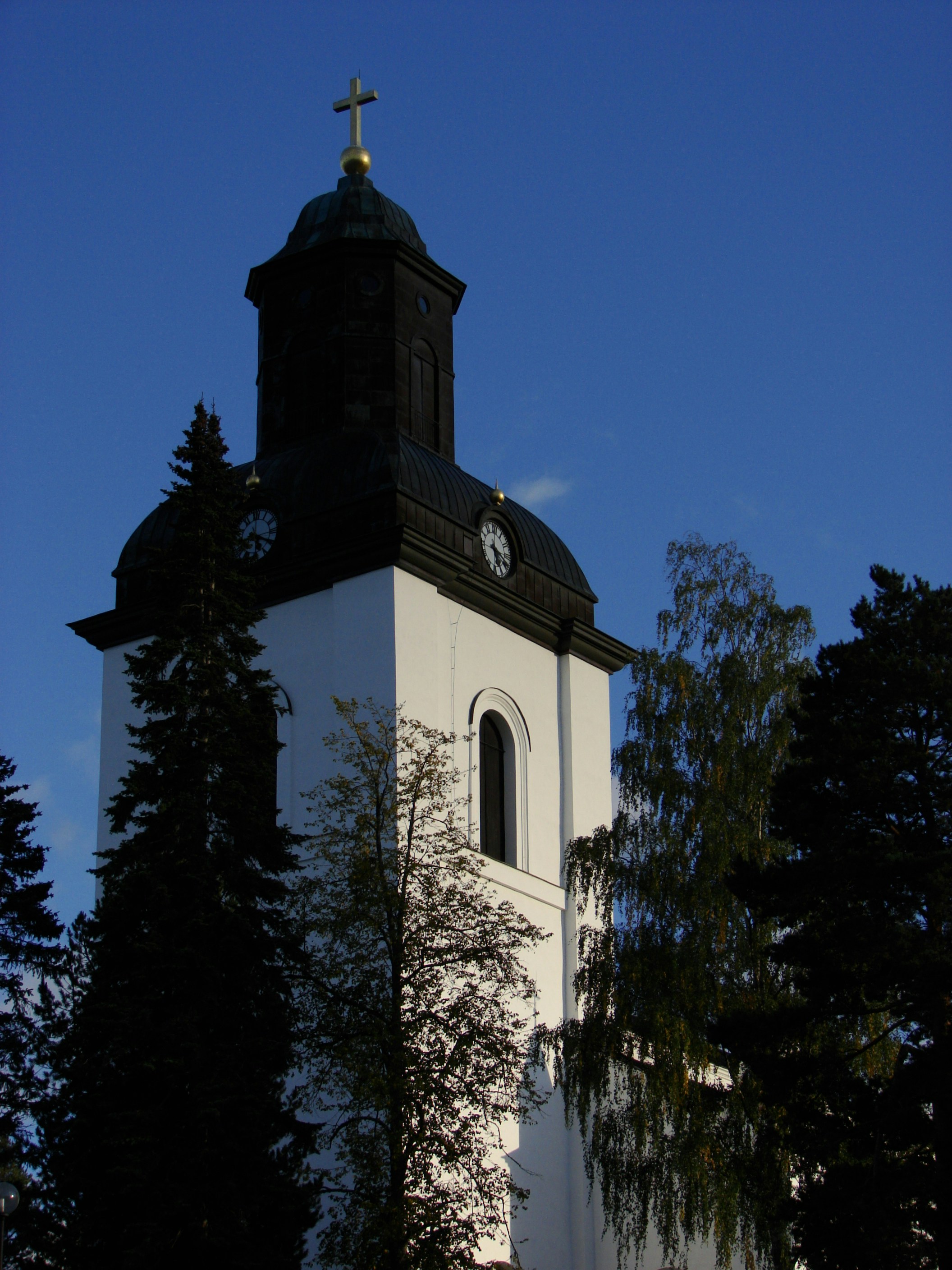 Tower of Dawn: A White-Churched Spire Reaching Toward the Sky