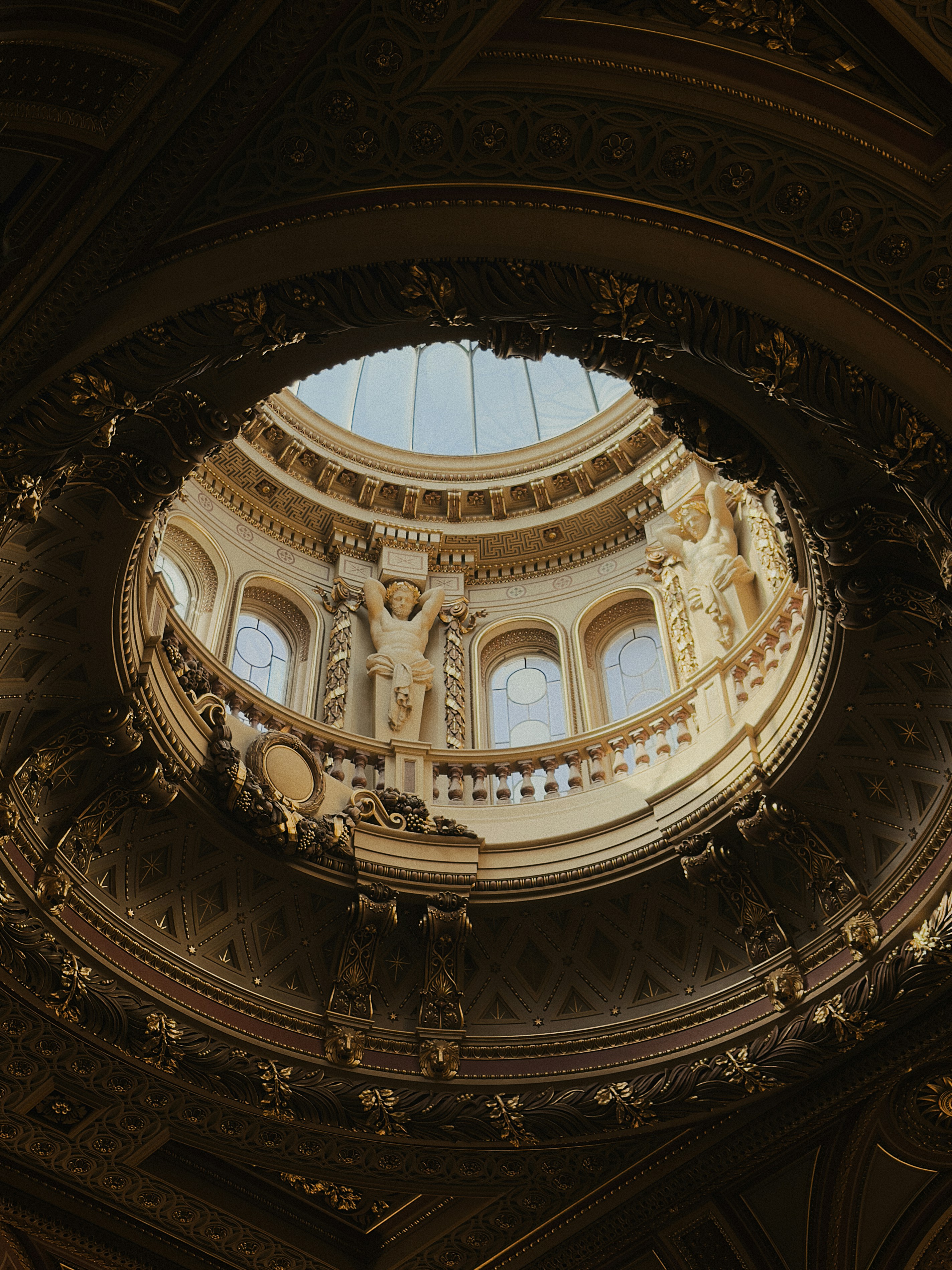 Crescent of Light: An Ornate Interior Seen Through a Dome Window