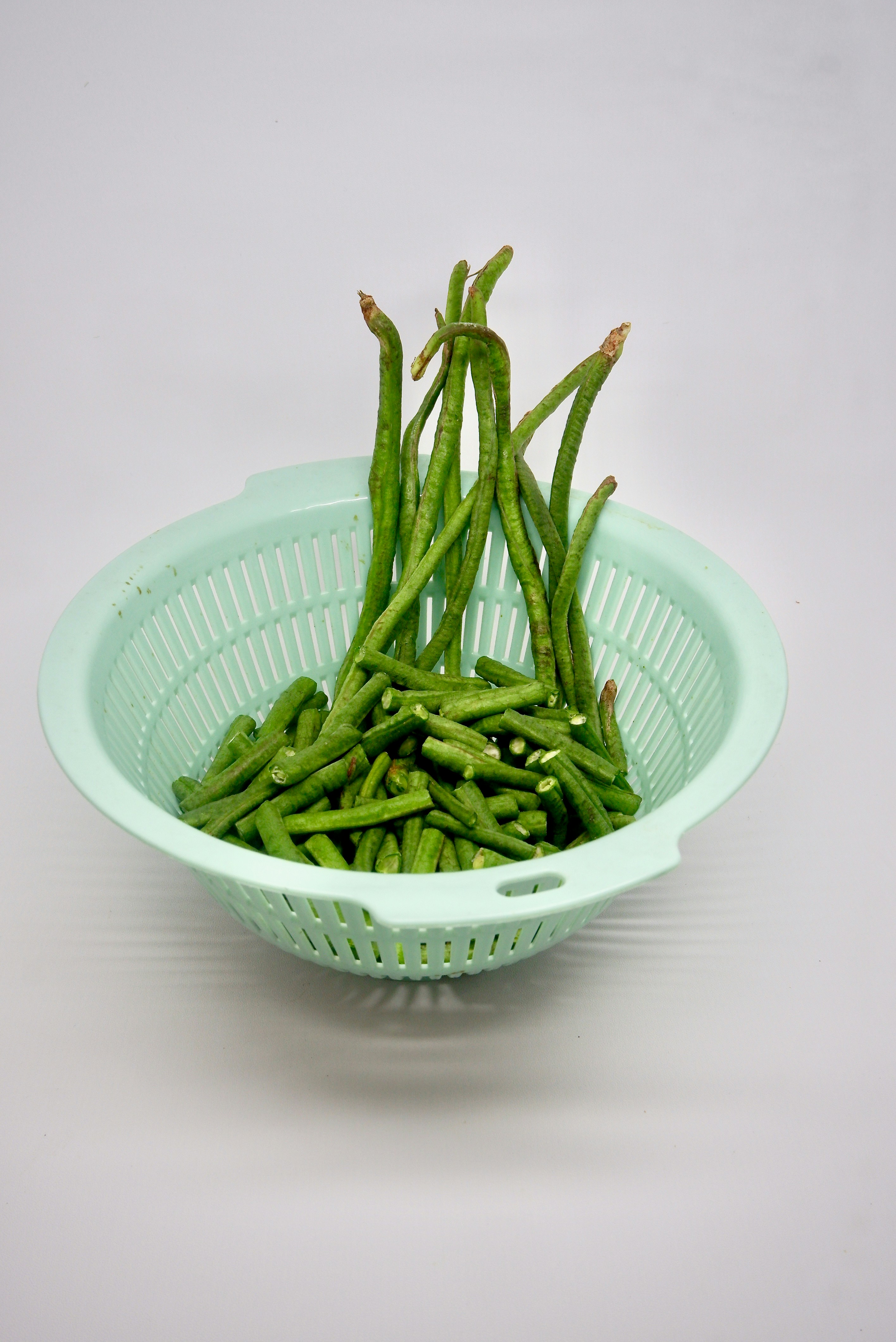 Green Bean Cascade in a Mint-Colored Colander