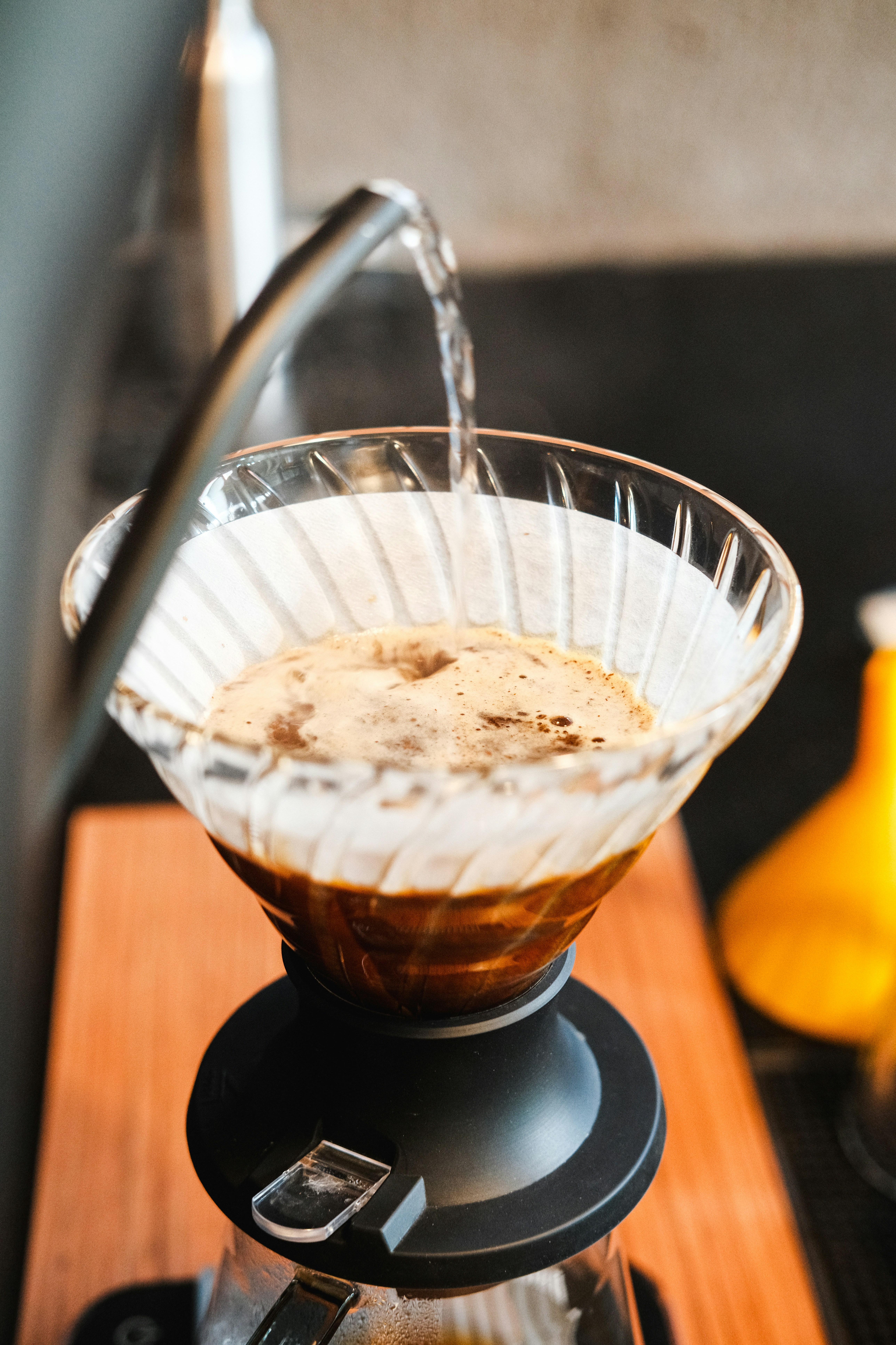 Coffee Ritual: A Tilted Pour Over in Focus